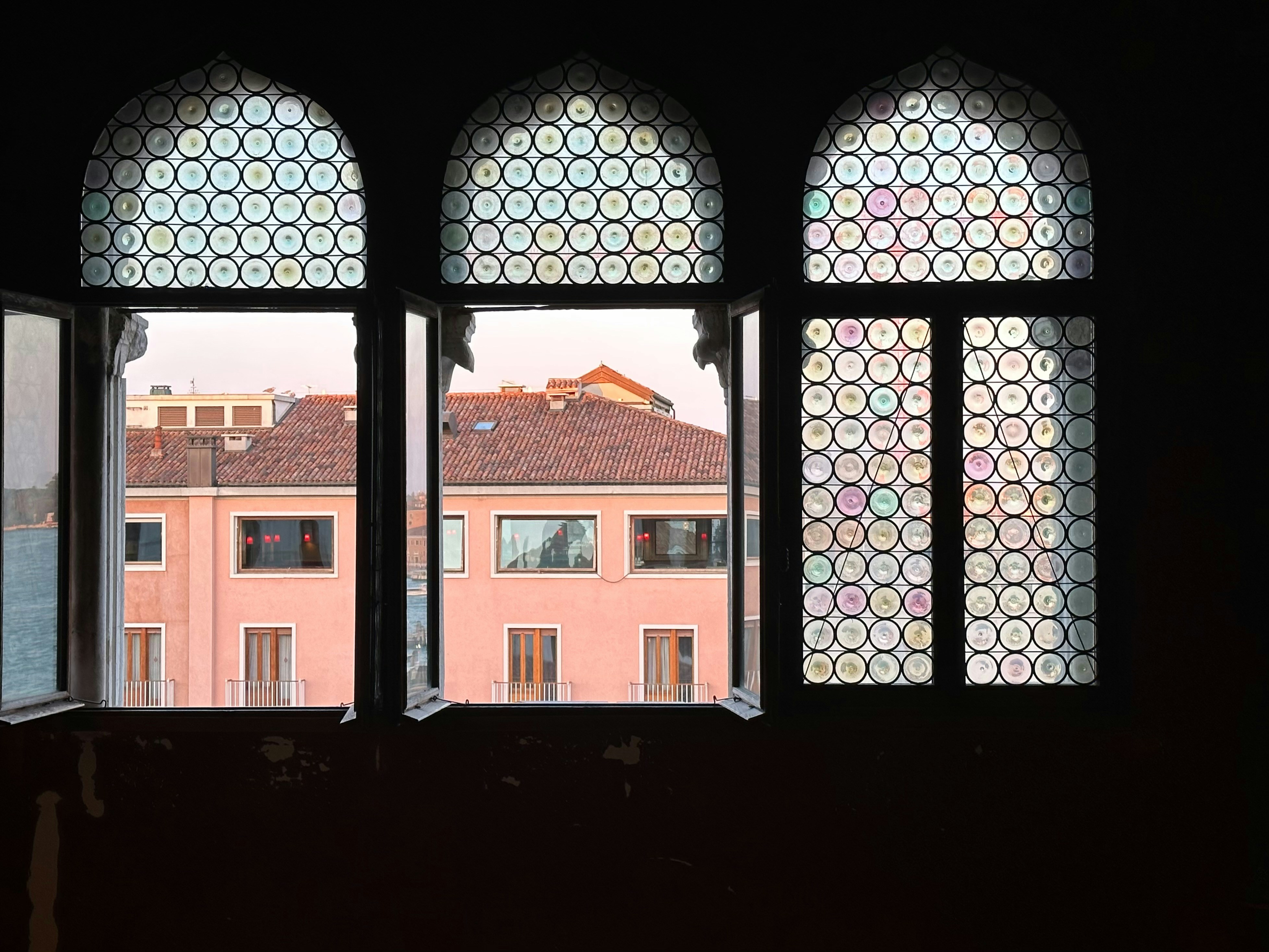 Windows of Colorful Circles Framing a Quiet Exterior