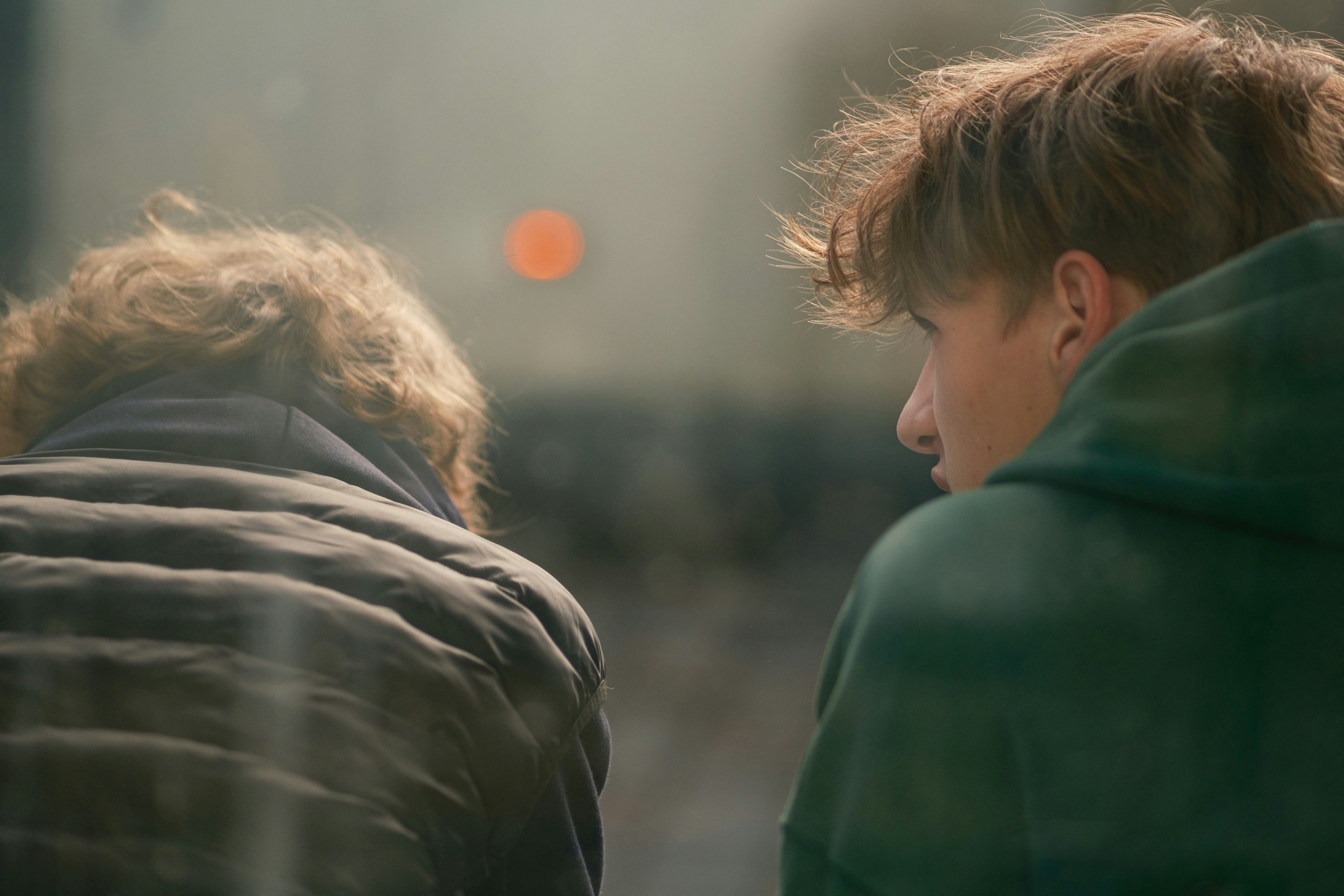 Two Friends in a Quiet Moment, Backlit and Intimate