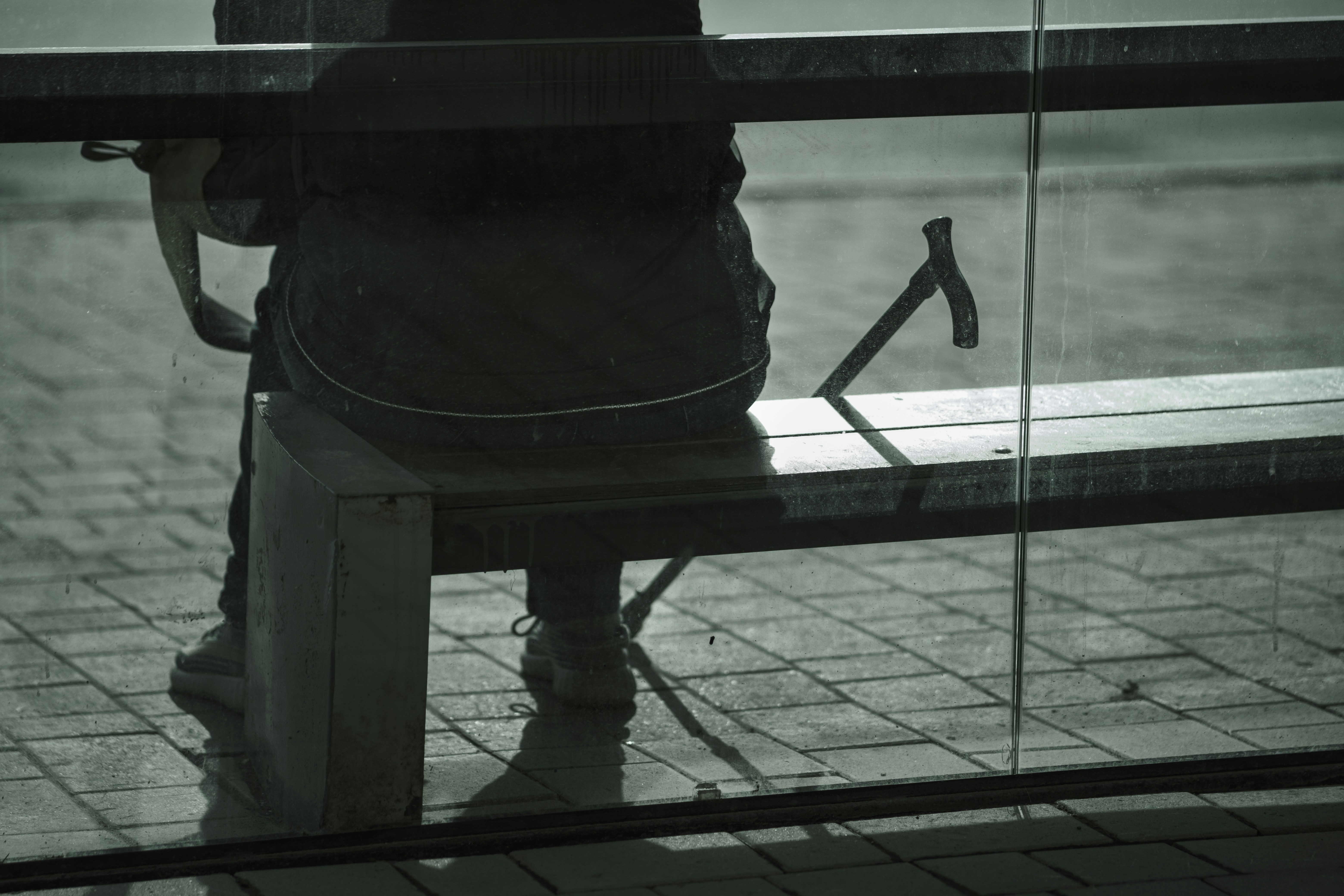 Silent Figure in a Glassroom