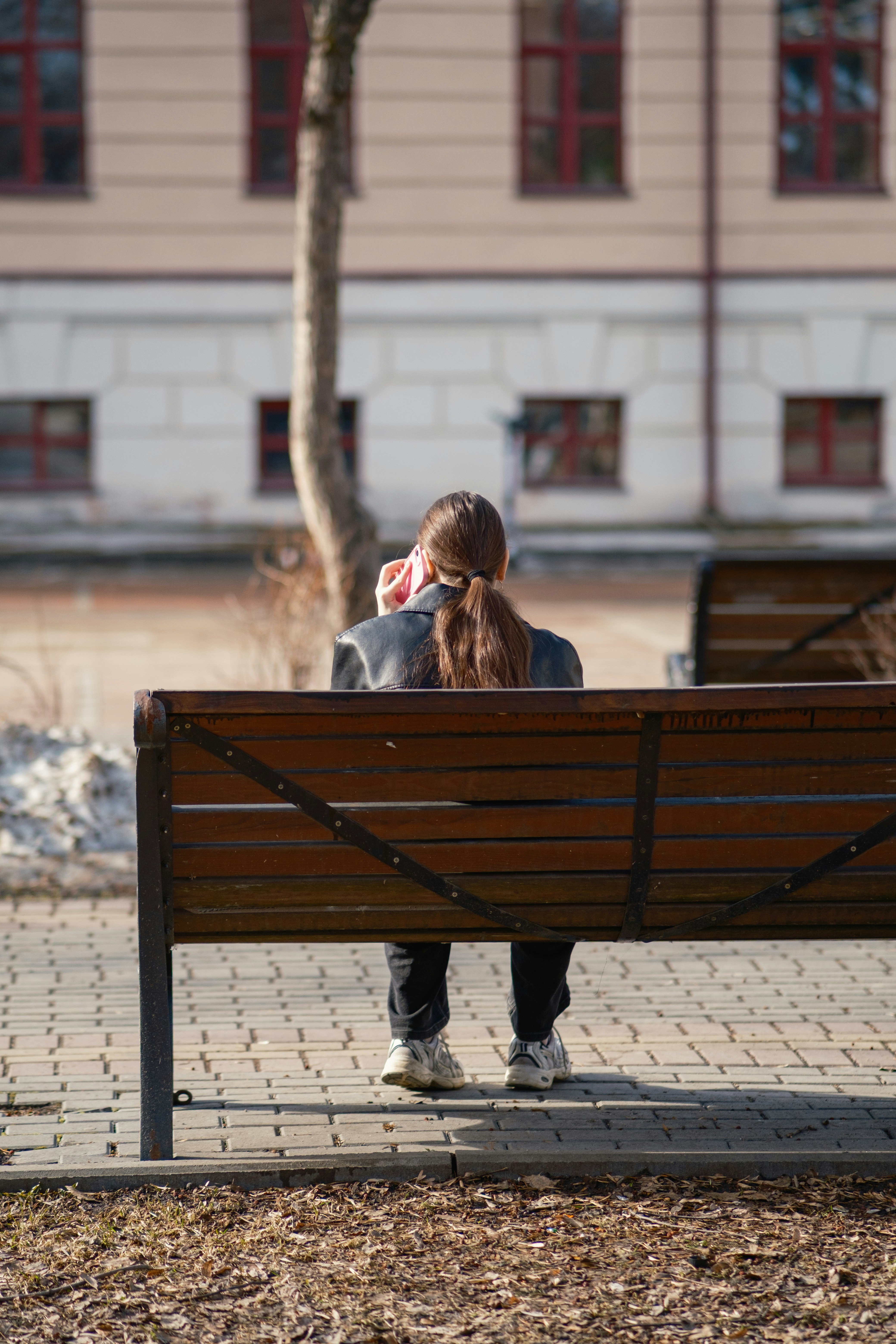 Backlit Portrait on a Park Bench