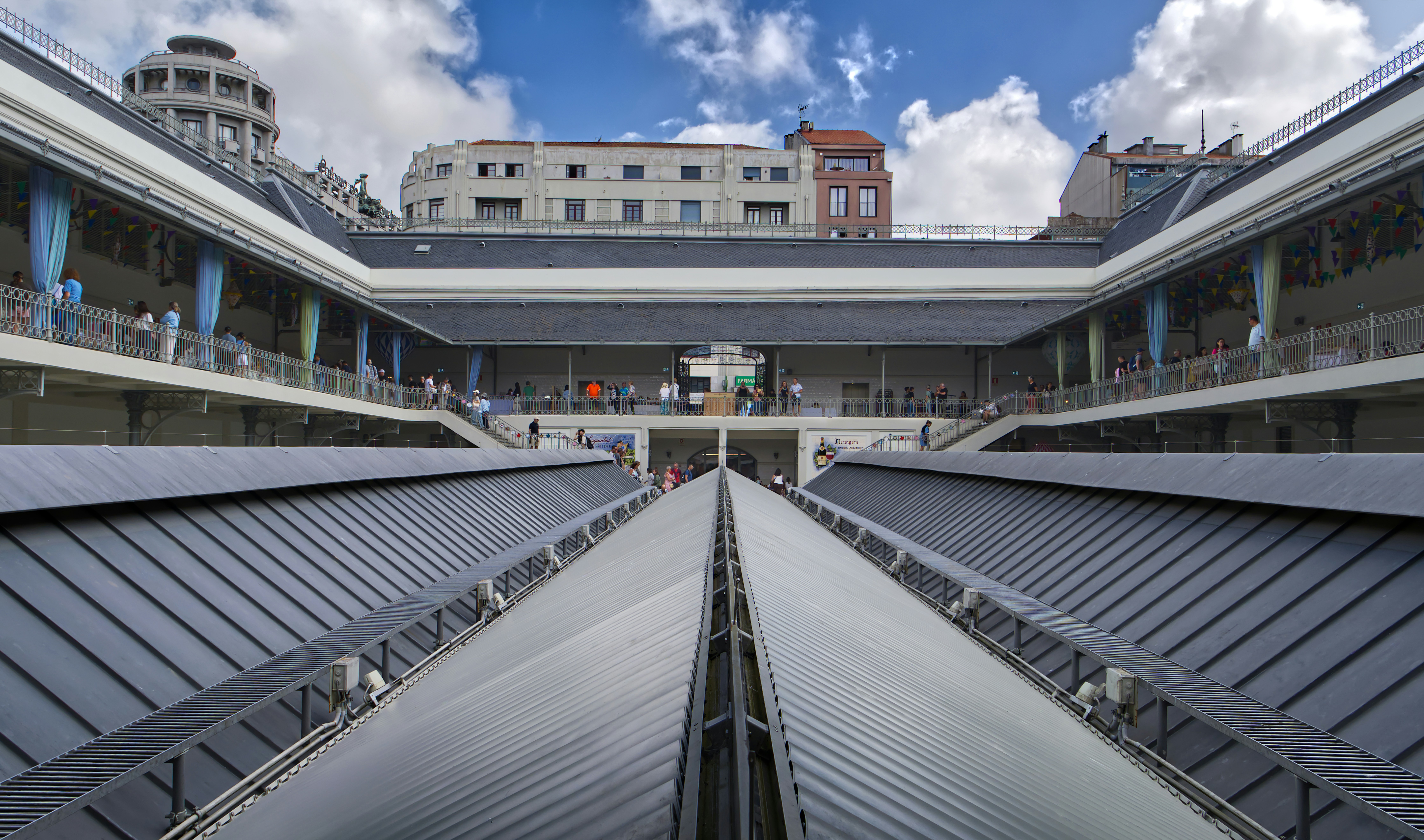 Symmetrical Rail of Light: A Rooftop Courtyard Perspective