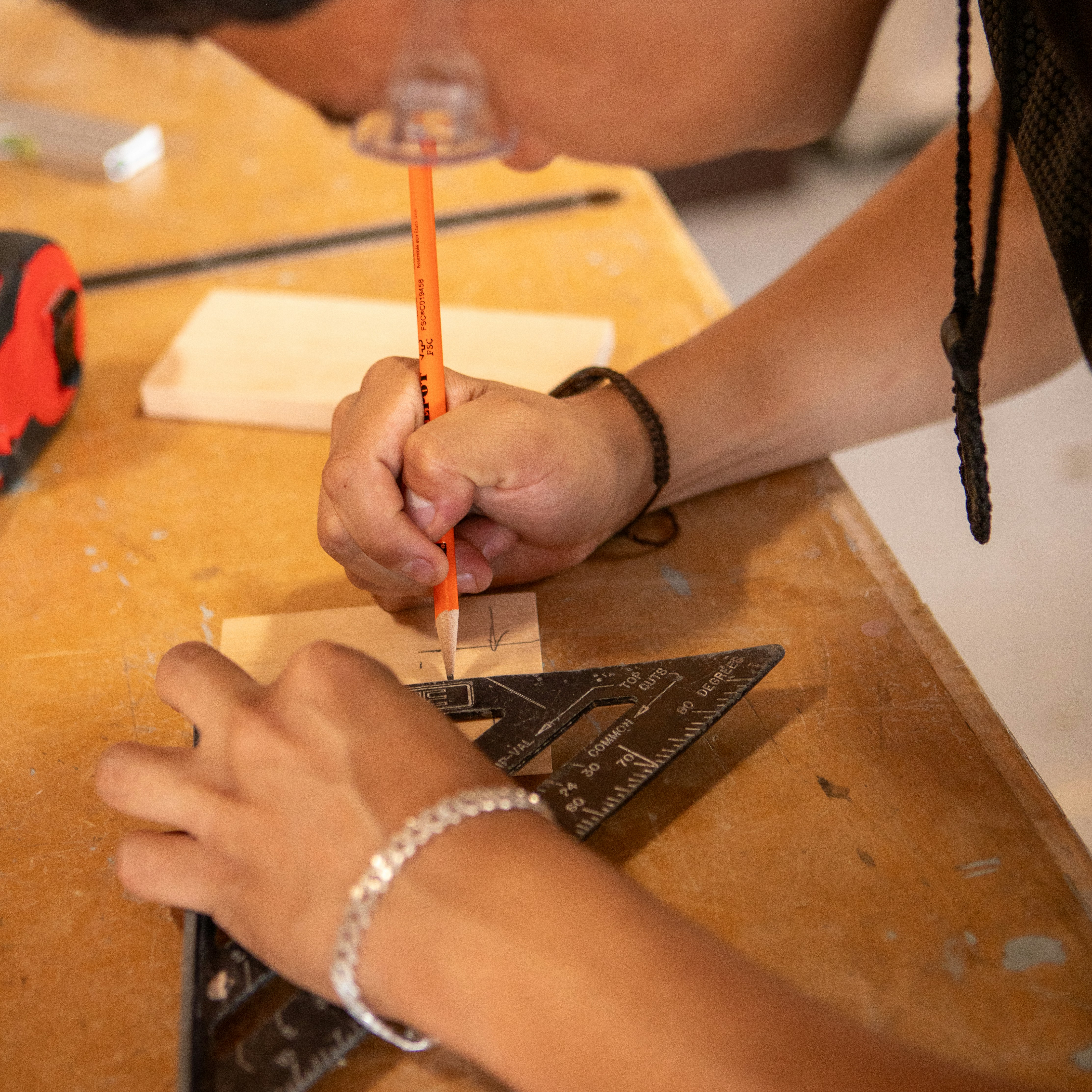 Hands at Work: Crafting Precision on the Wooden Bench