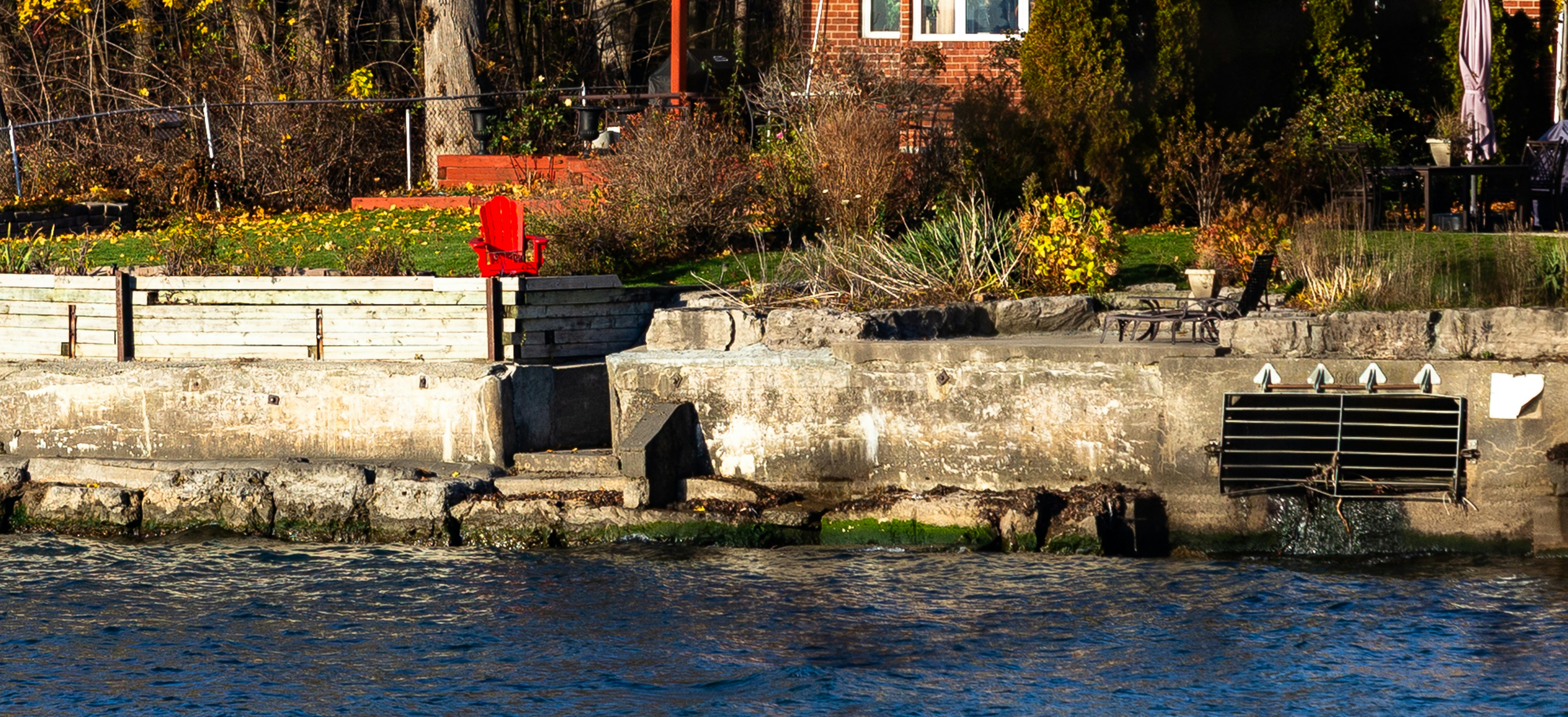 Red Life by the Water: A Quiet Riverside Scene