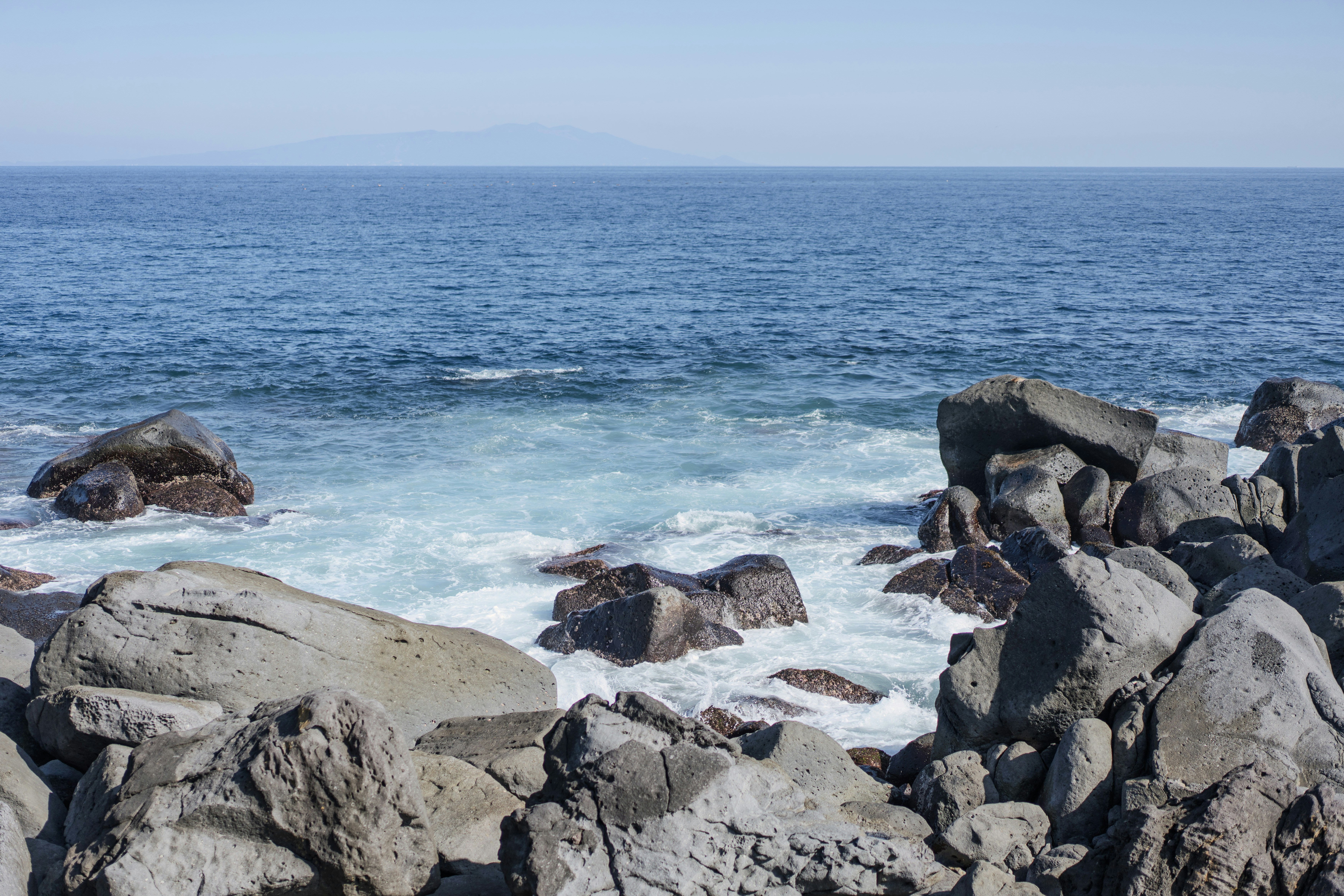 Coastal Stones at Dawn: A Quiet Meeting of Sea and Rock