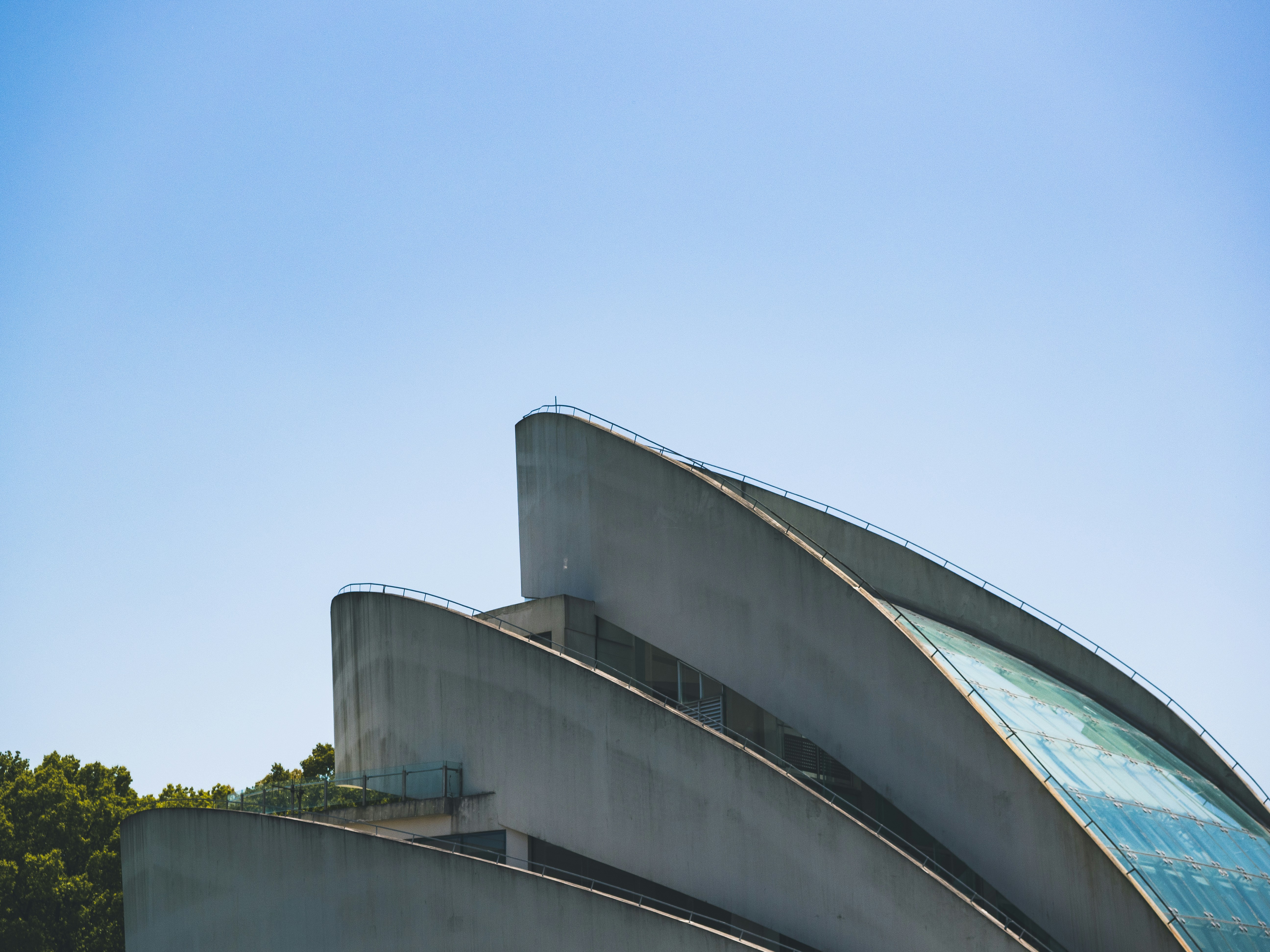 Curved Concrete Convexes under a Clear Sky