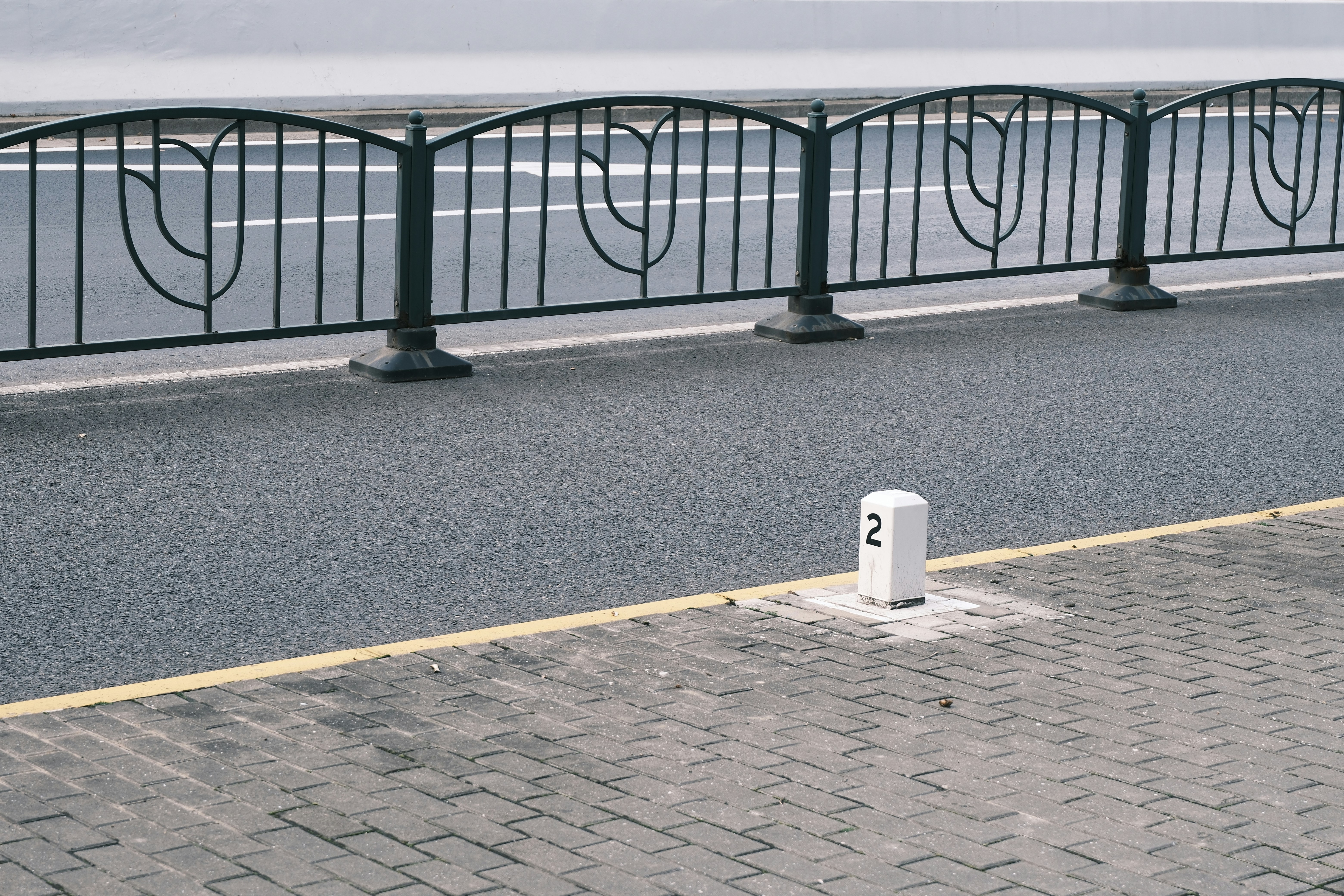 Single Mile Marker by the Seawall
