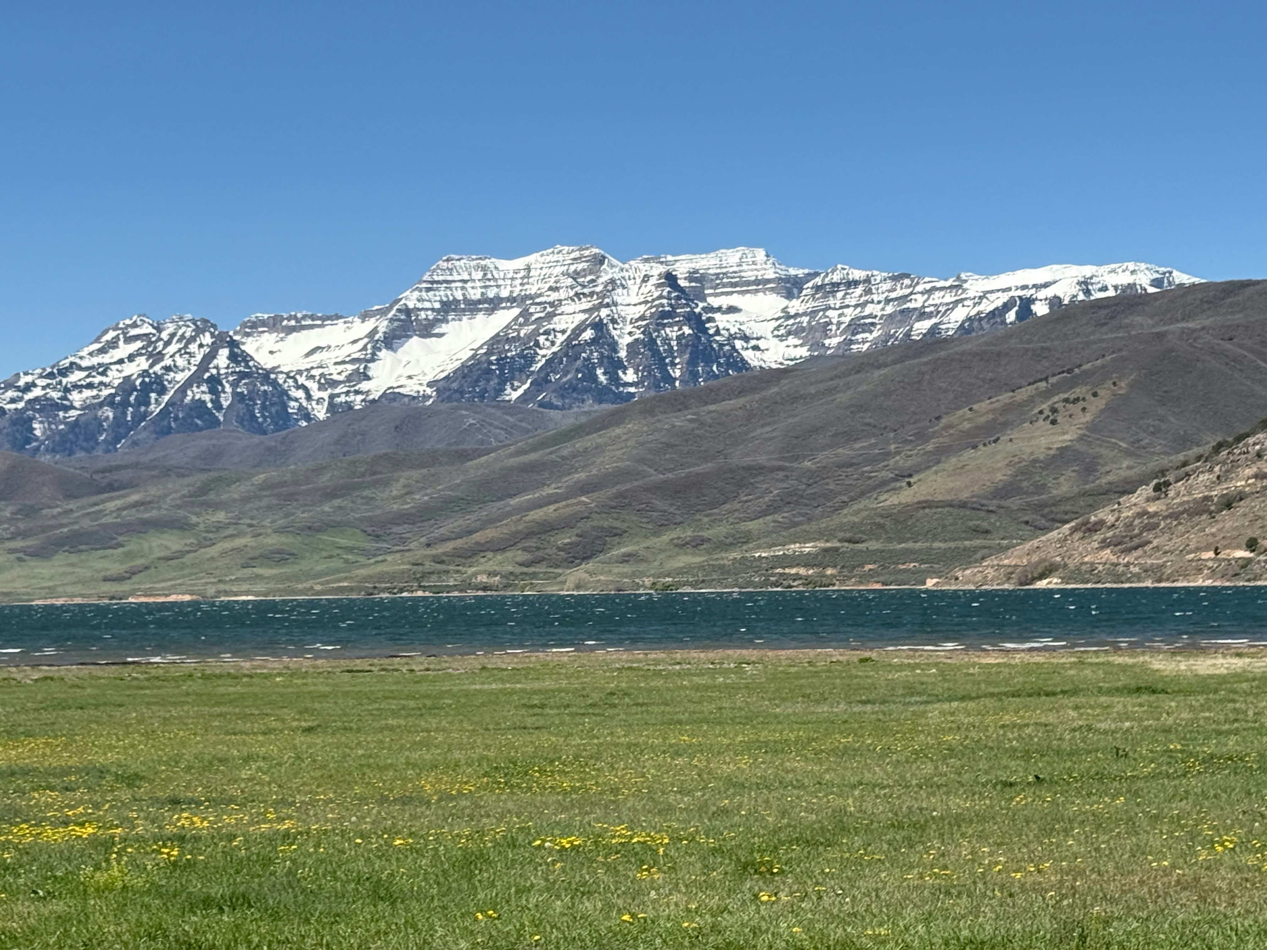 Snow-Capped Peaks Over a Quiet Alpine Lake