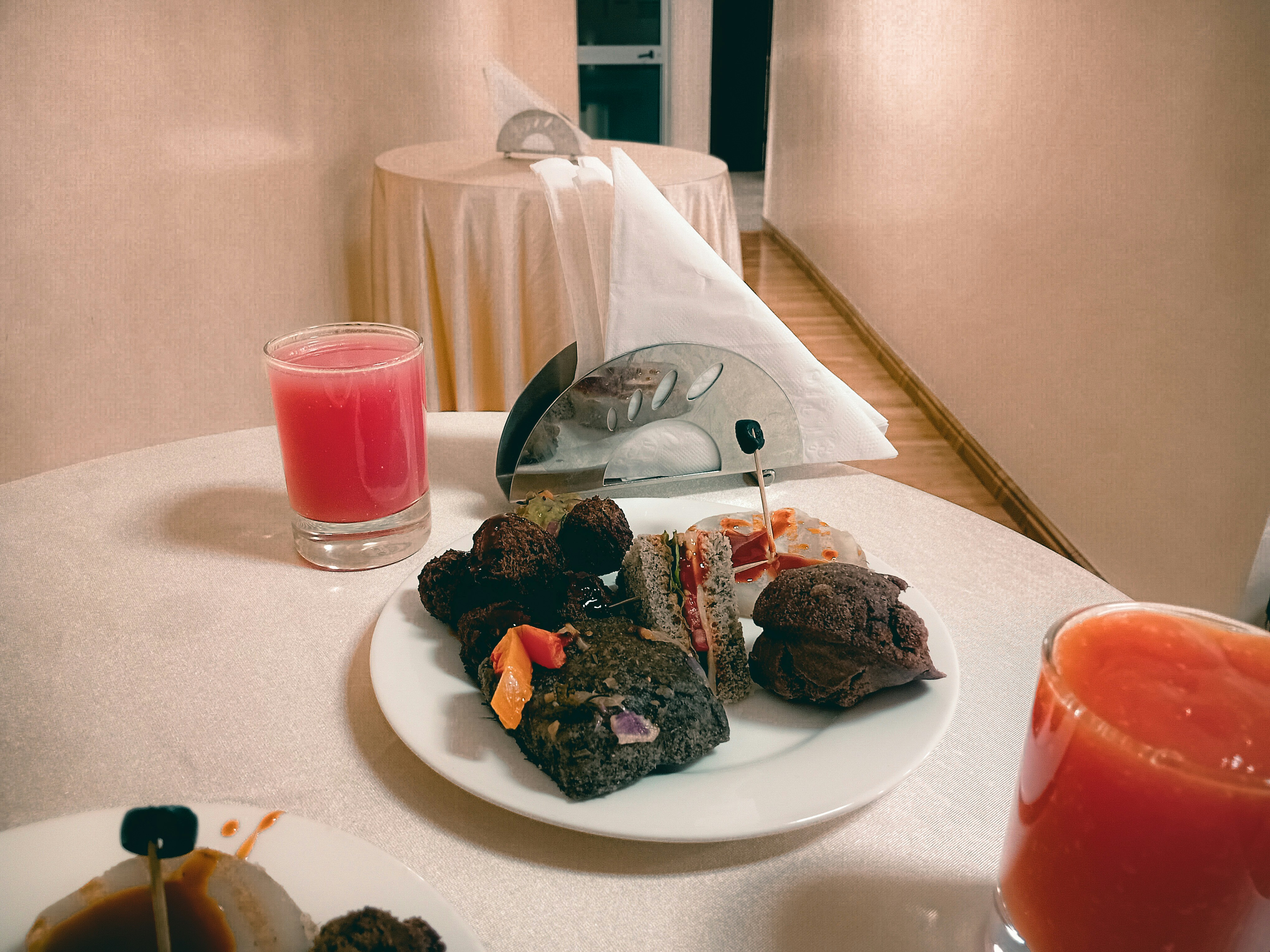 Midday Dessert Spread: Chocolate Muffins and Fresh Juice