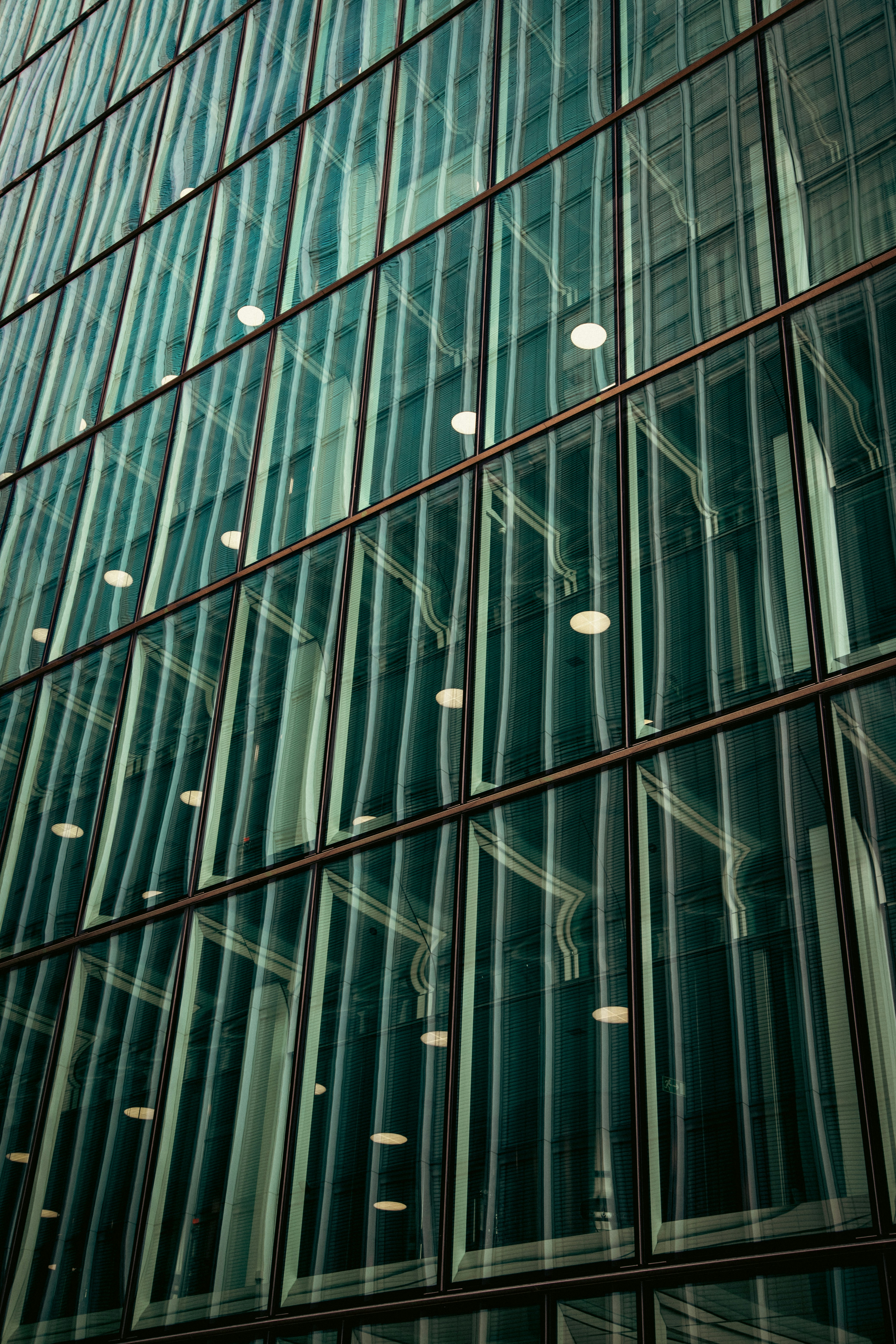 Glass Facade Echoes: Parallel Lines and Reflections
