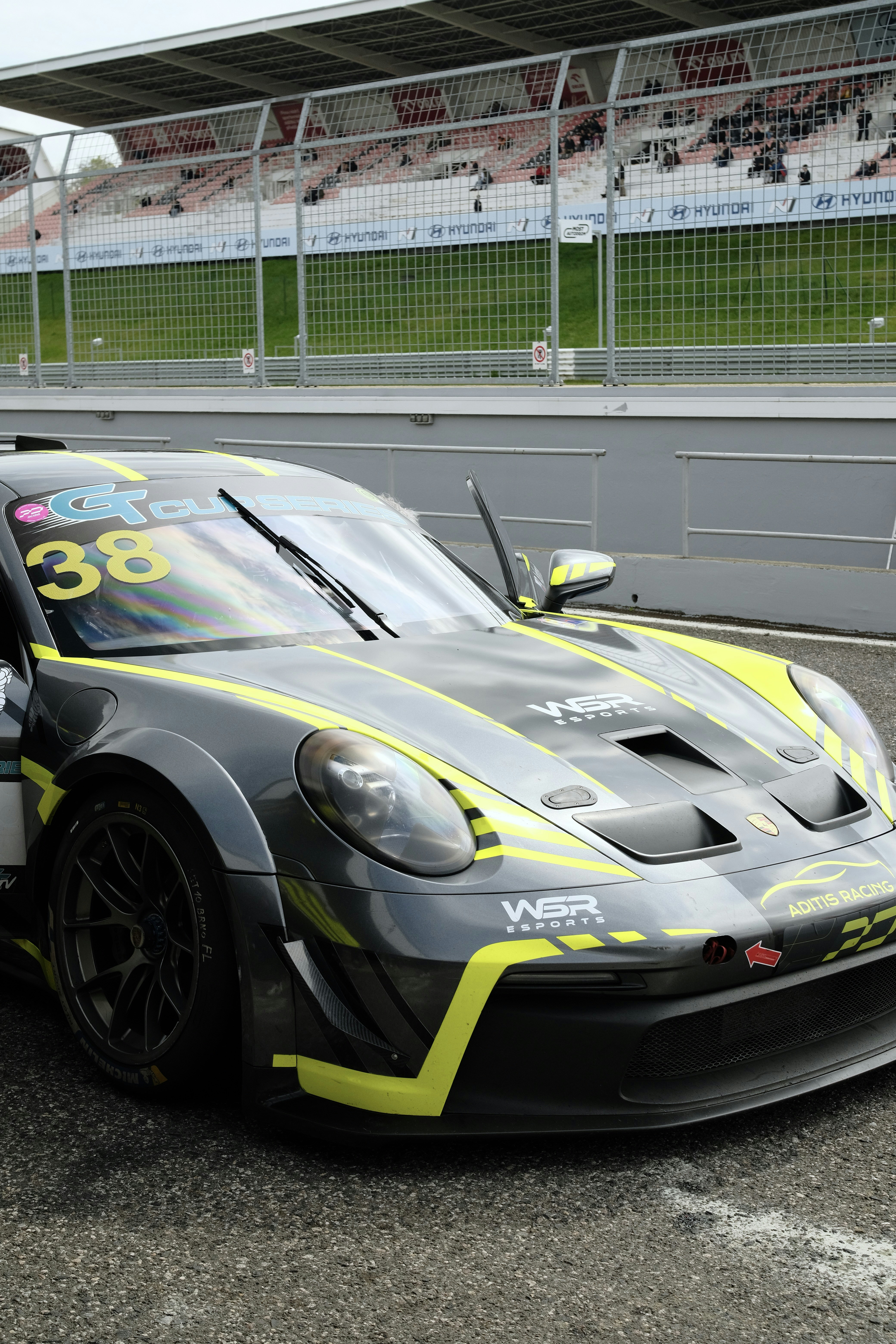 Racing Machine in the Pit Lane: Neon Accents and Aerodynamic Curves