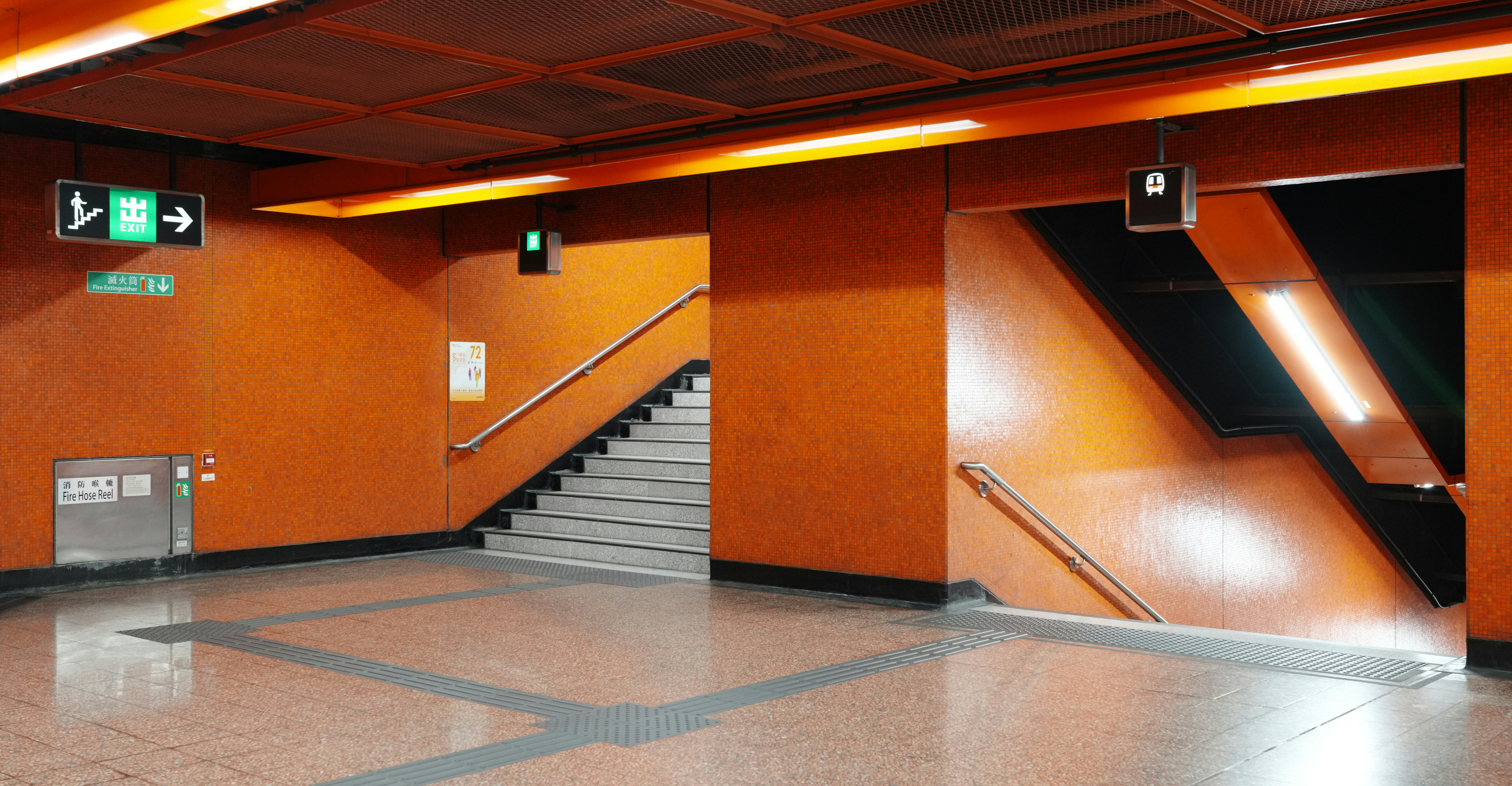 Orange Staircase Corridor in Subterranean Station