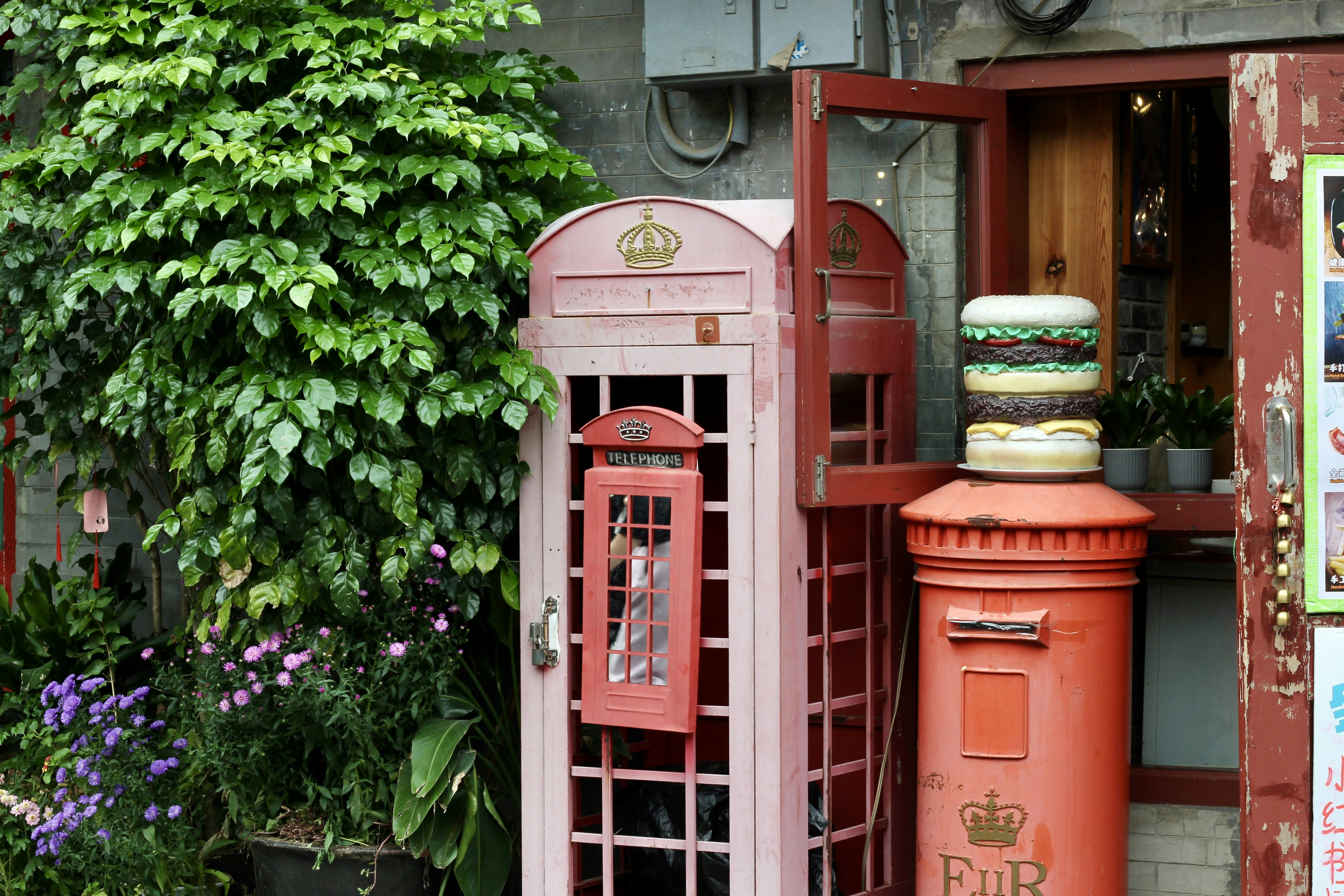 Postal Alley: A Pink Phone Booth Awakens the Street Corner