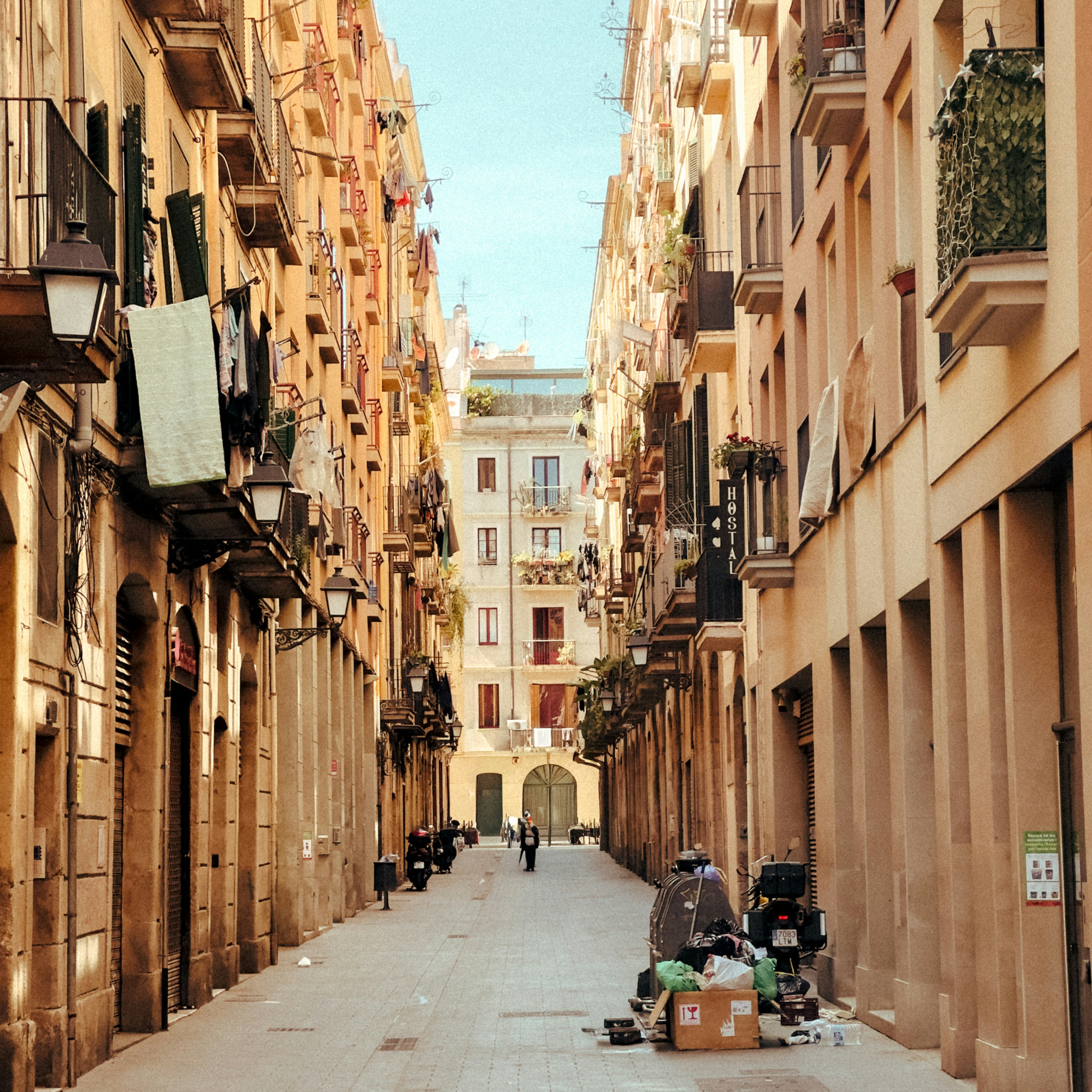 A Sunlit Alleyway: Symmetry and Warmth in a European Corridor