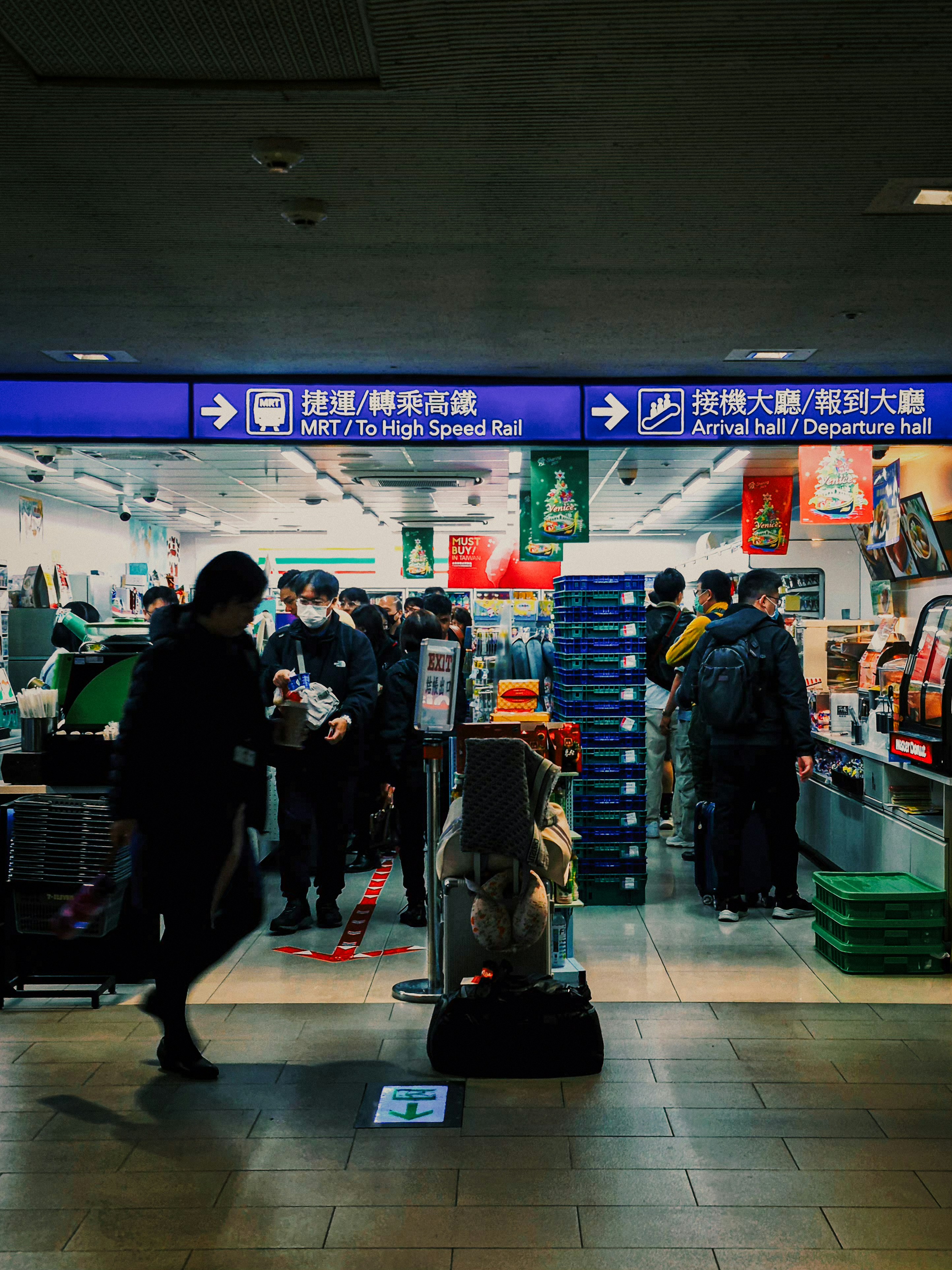 Terminal Pulse: Commuters in a Busy Rail Station Snack Bar
