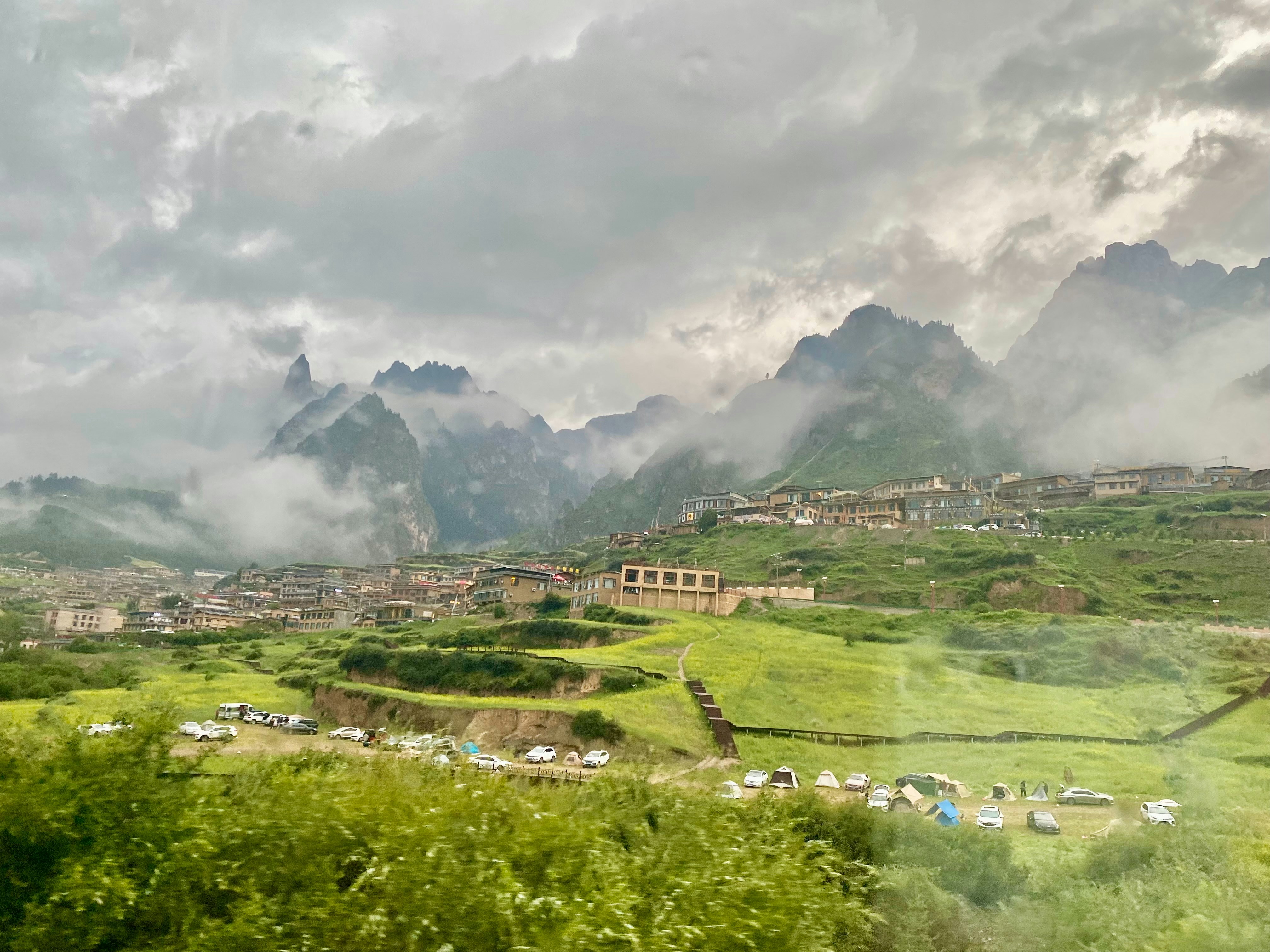 Mist over Terraced Valley: Village Below the Peaks