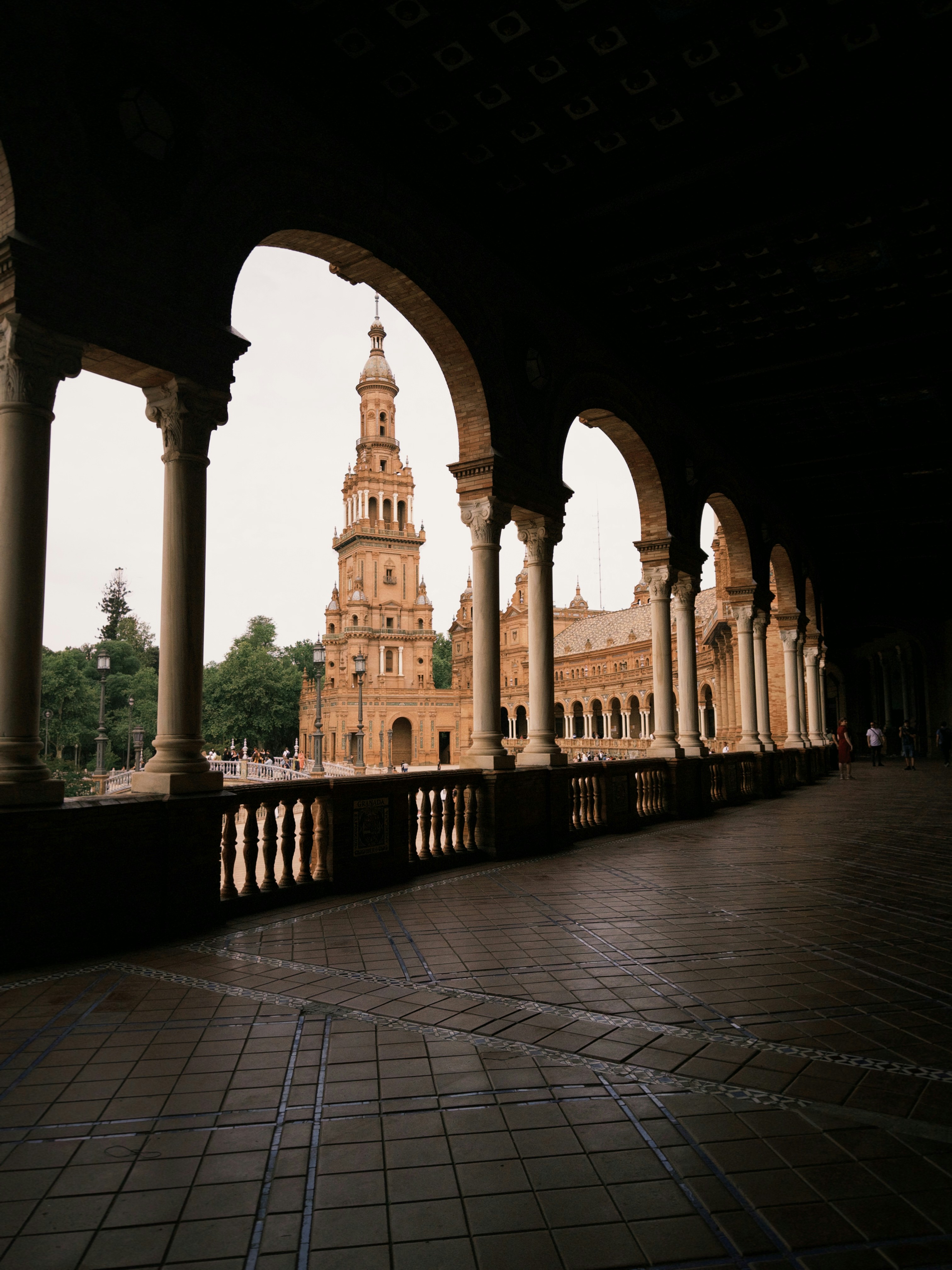 Colonnaded Terrace Framing a Towered Angular Vista