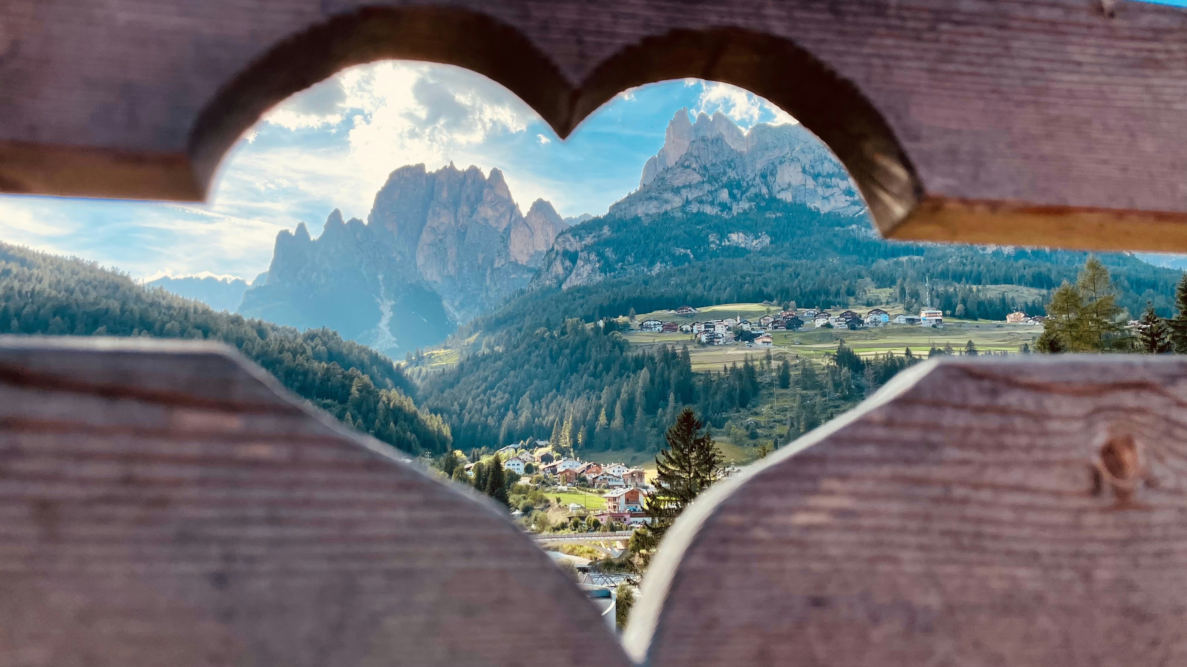 Heart of the Valley: Mountain Ridge Framed in a Carved Window