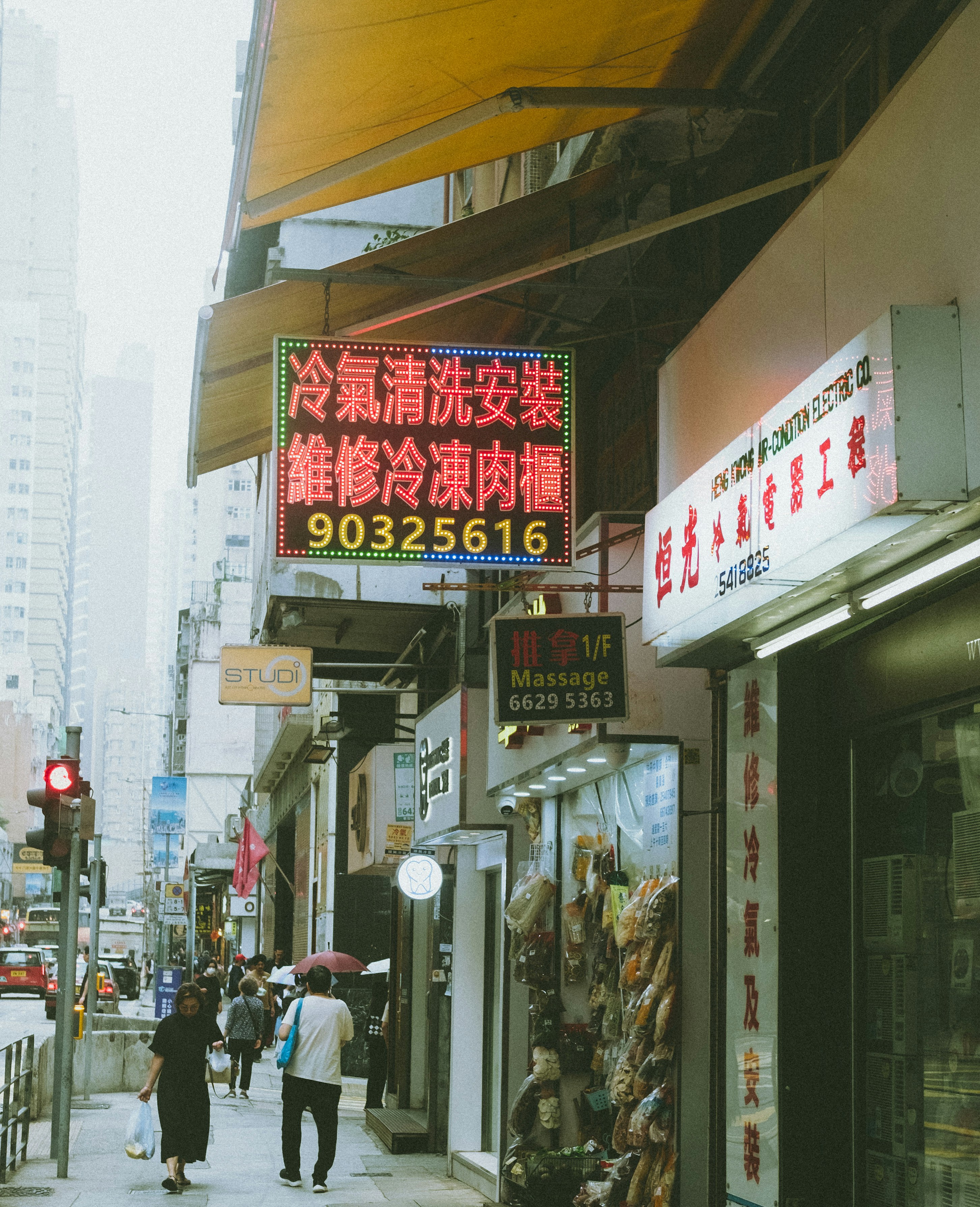 Neon Sign Alley: Street Scene with Shoppers and Signs