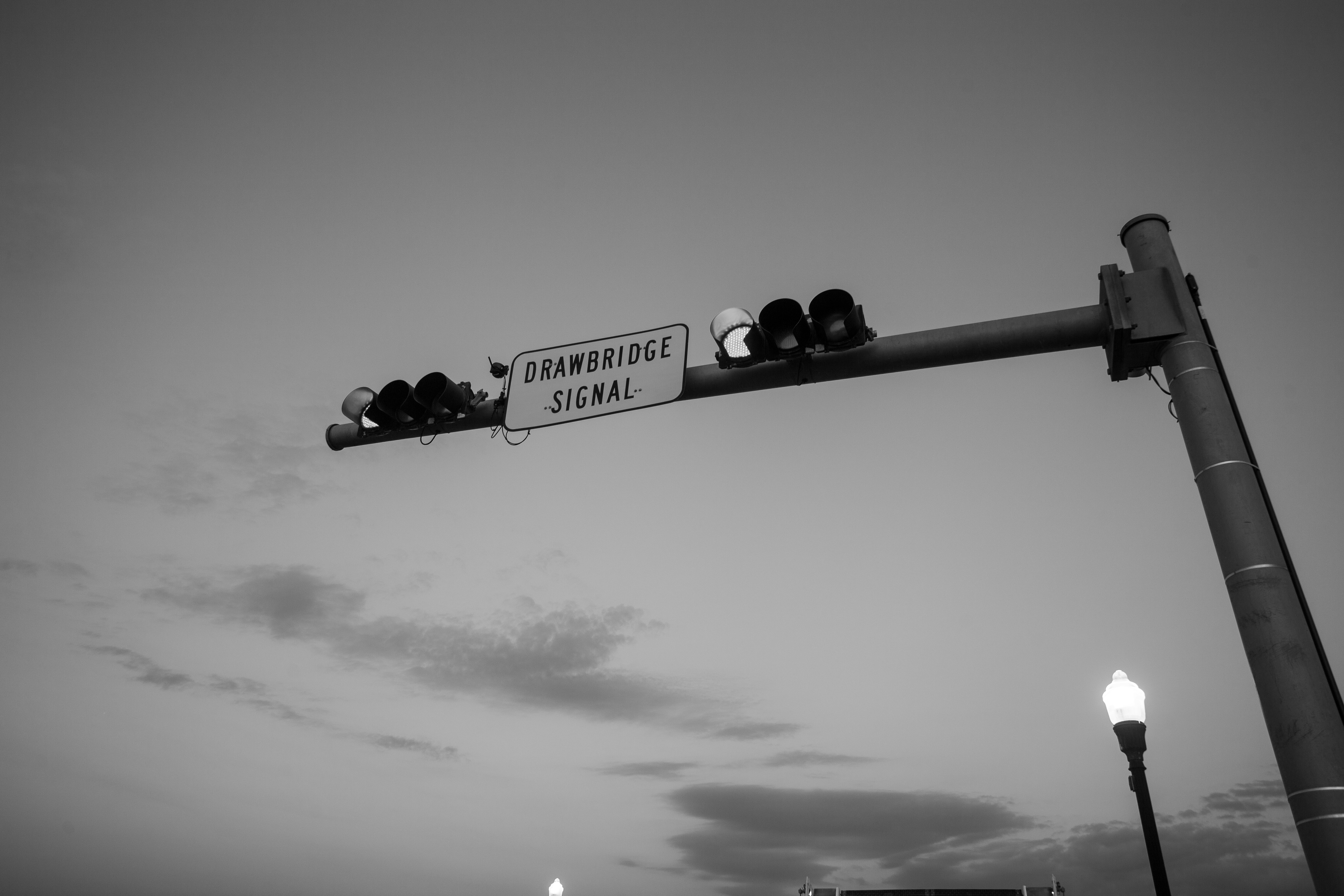 Drawbridge Silhouette Under Quiet Evening Sky