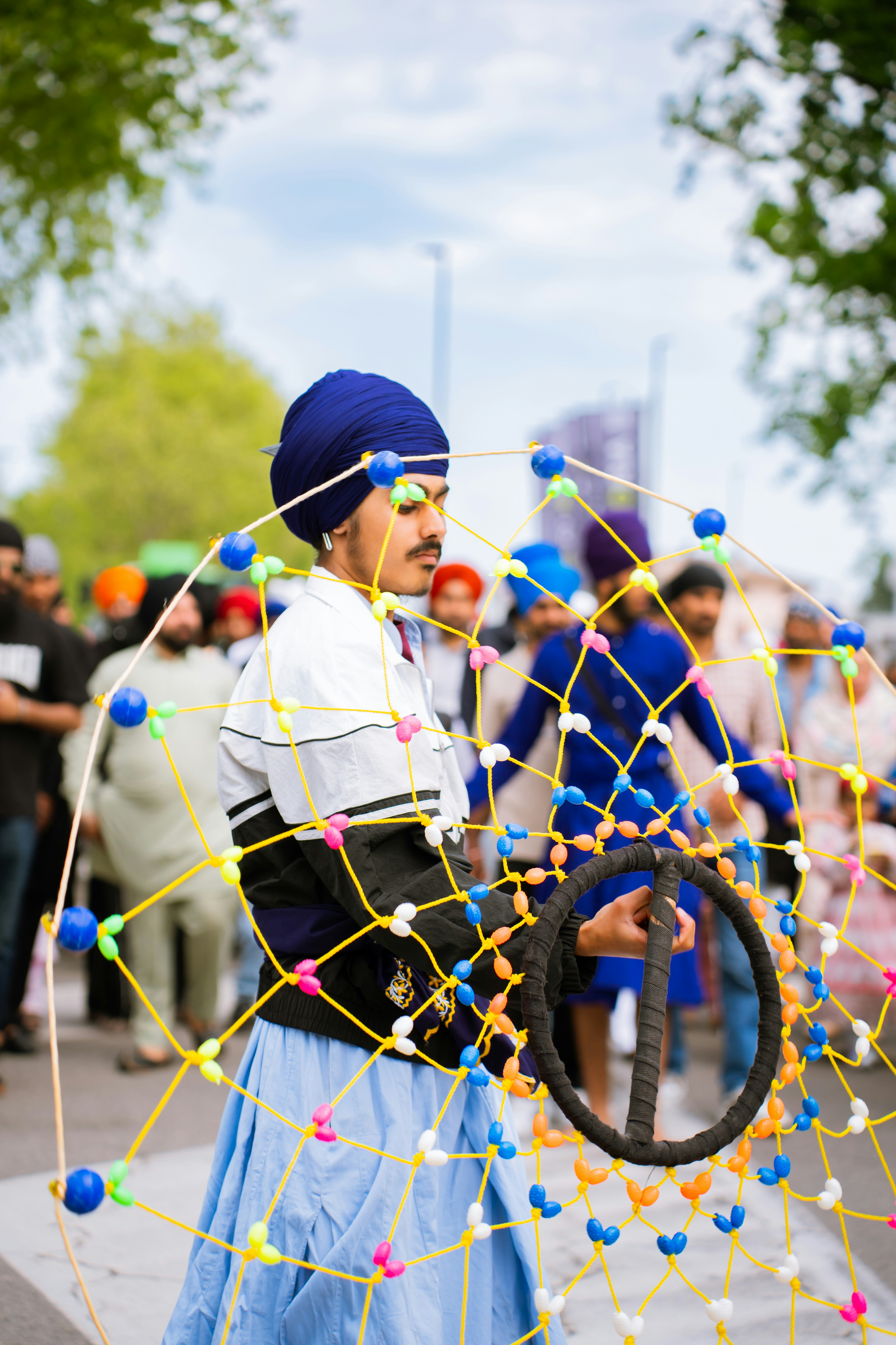 Blue Turban, Golden Web: A Majestic Dandiya Moment