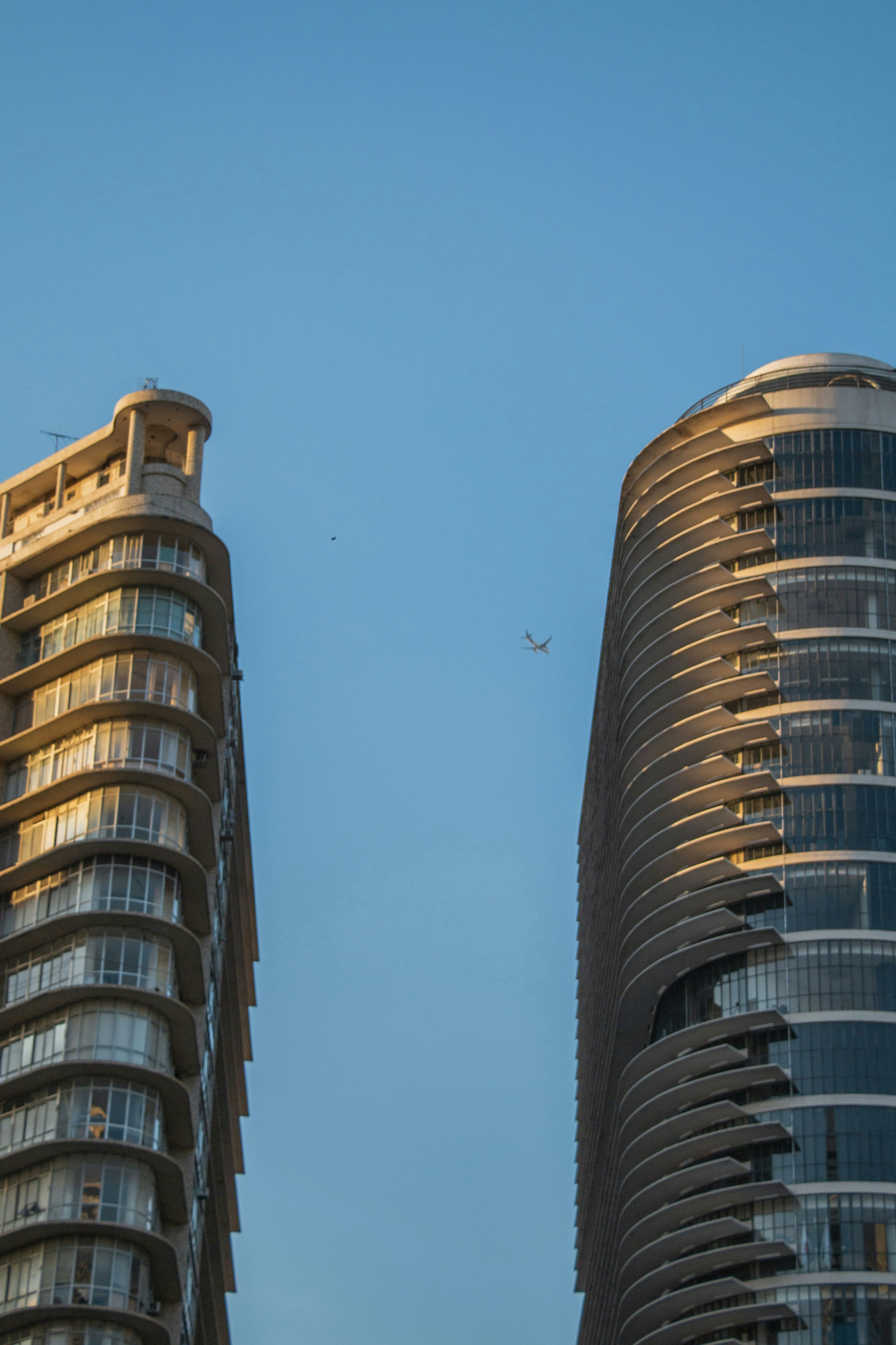 Skyline Confluence: Tower Schedules and a Distant Plane