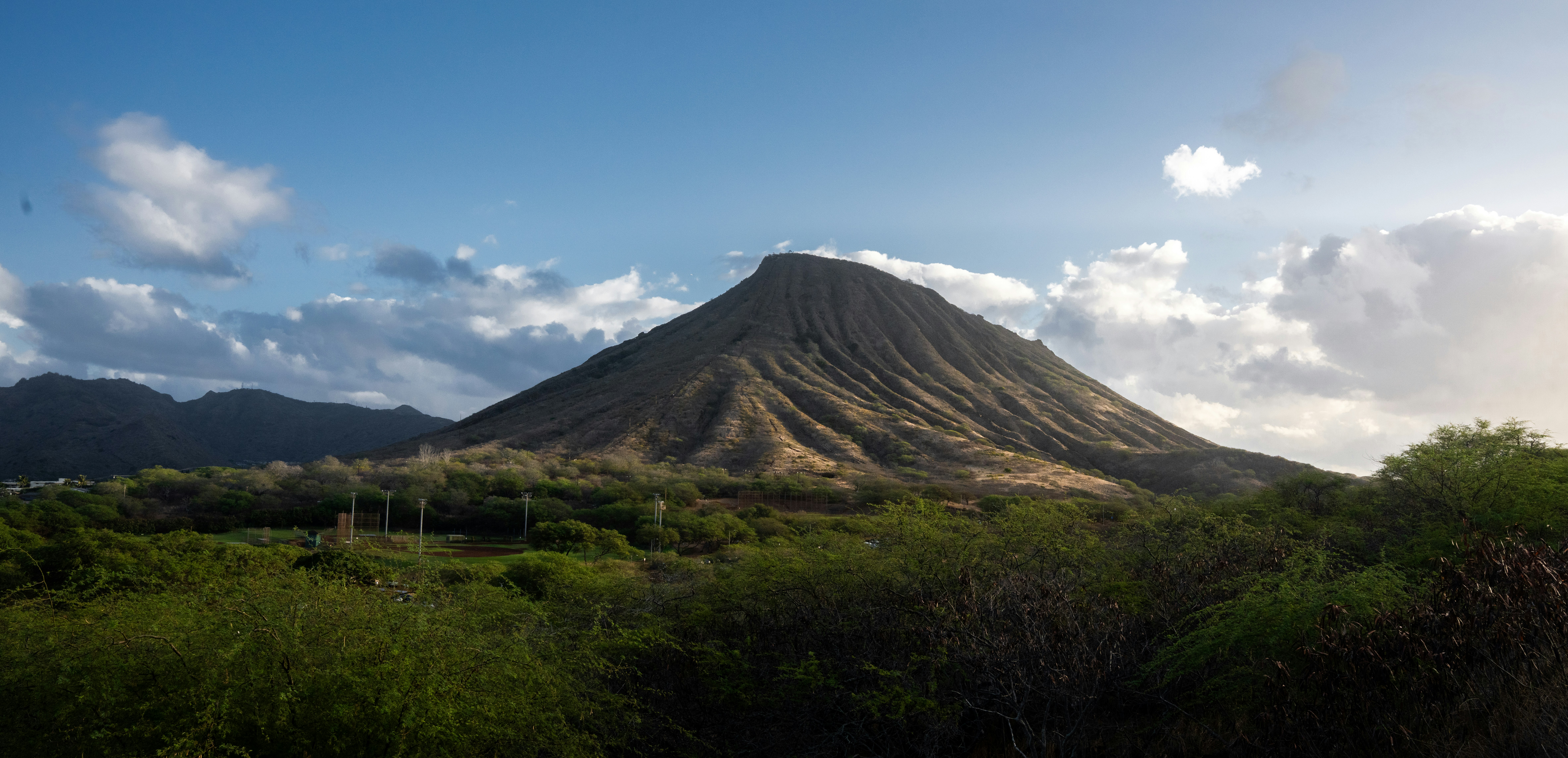 Cone of Calm: A Lone Volcanic Peak Rising Above Savanna