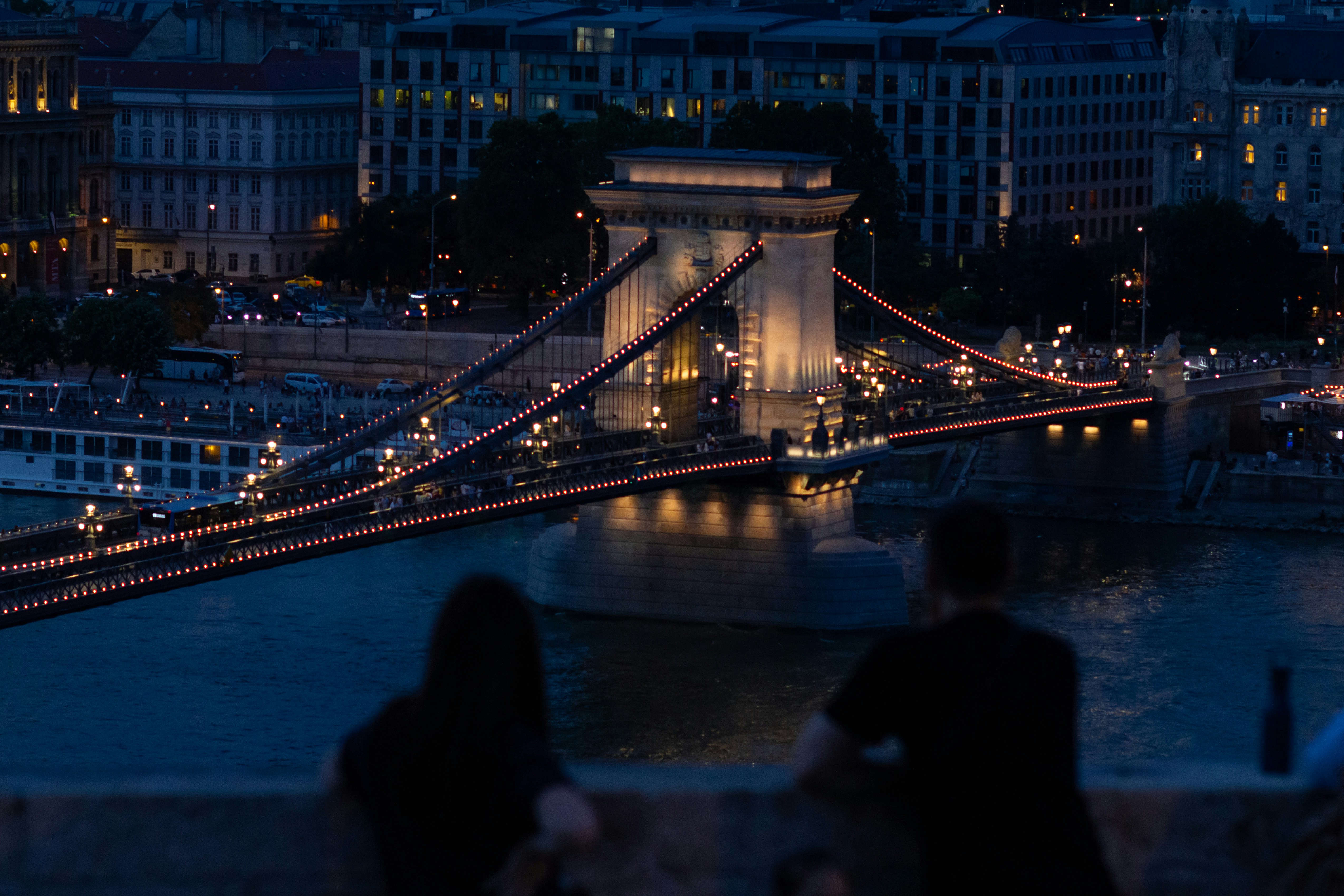Twilight Footpath Over the Thames: Warm Lights of the Tower Bridge
