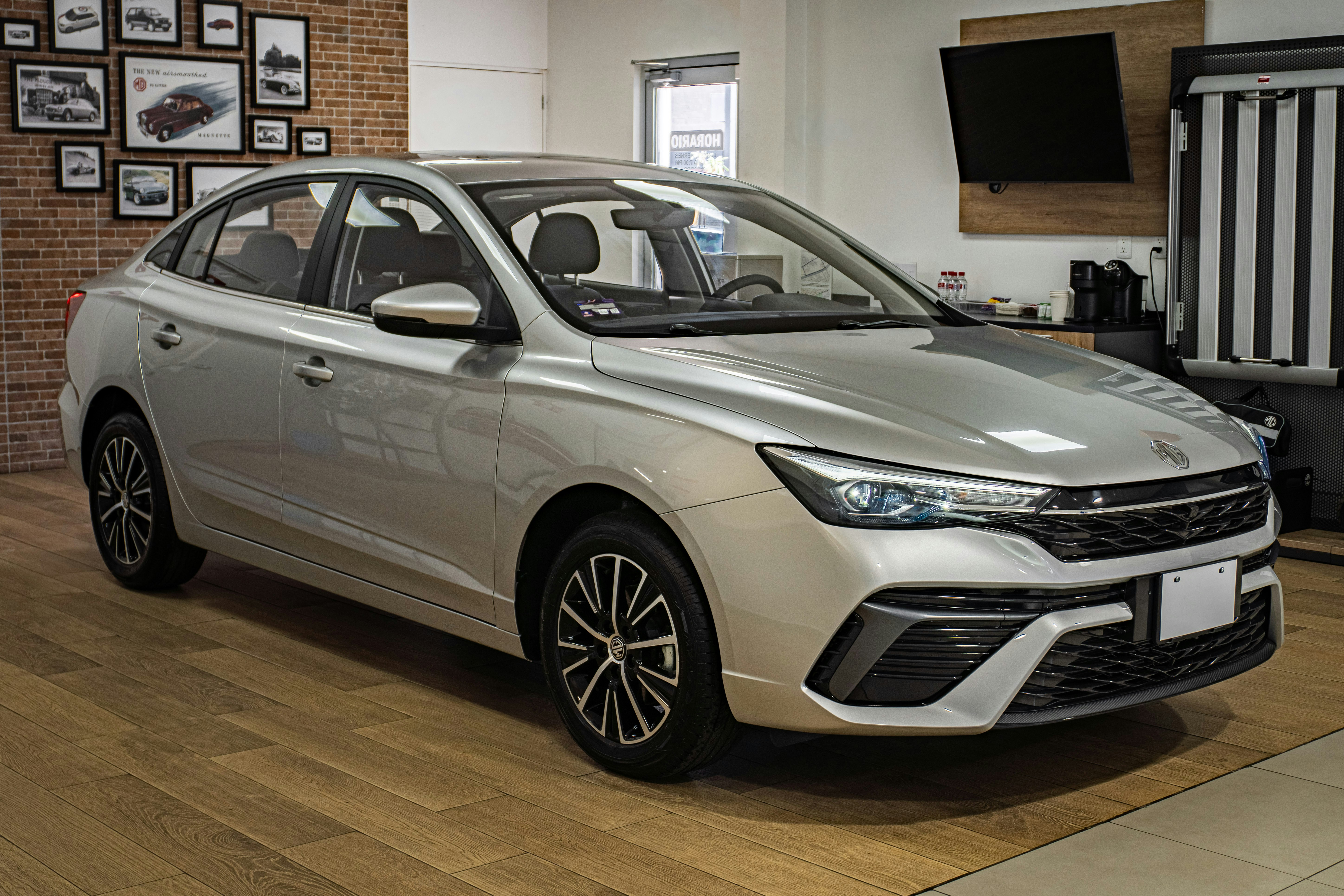 Showroom Silver: A sleek sedan under studio lighting