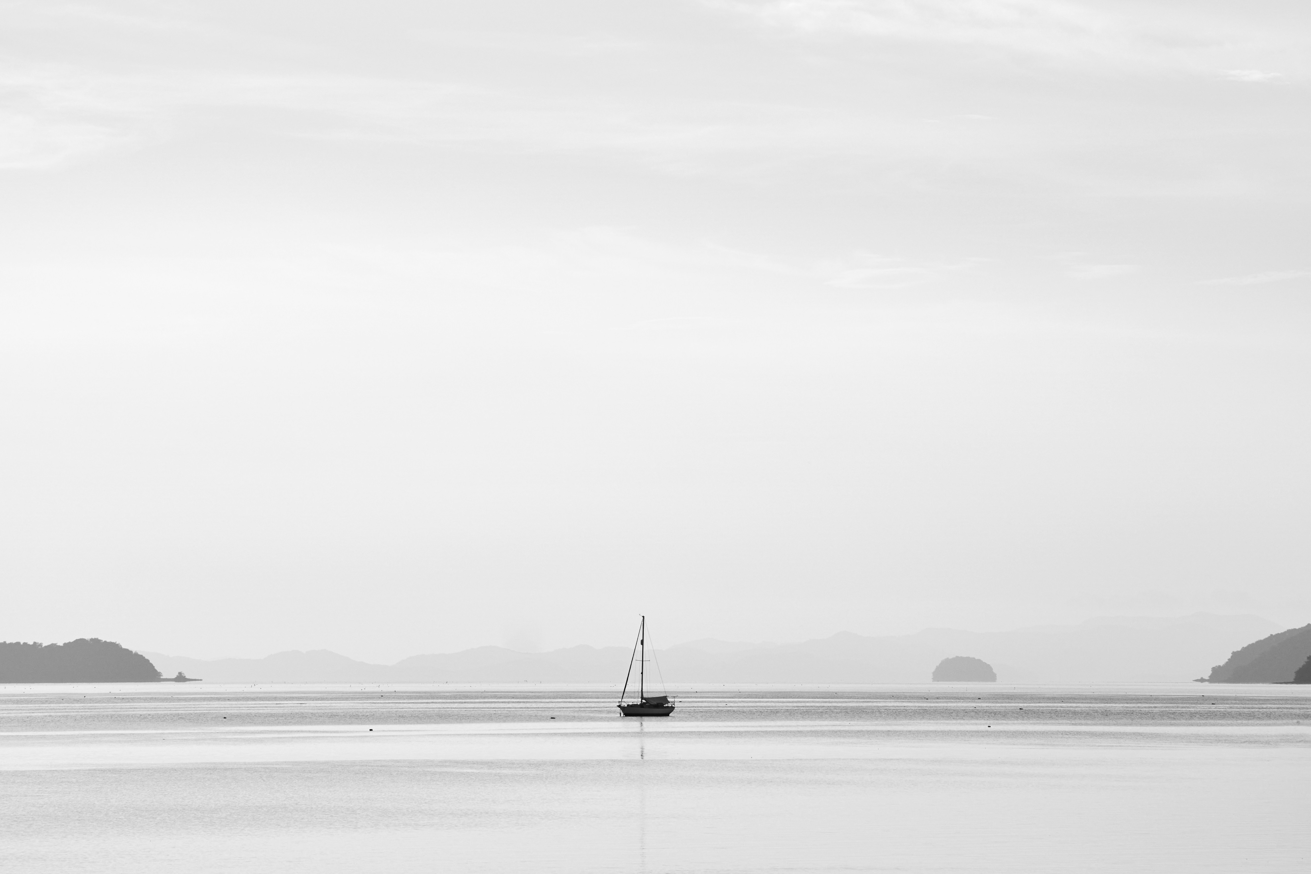 Solitary Vessel at the Center of a Quiet Sea