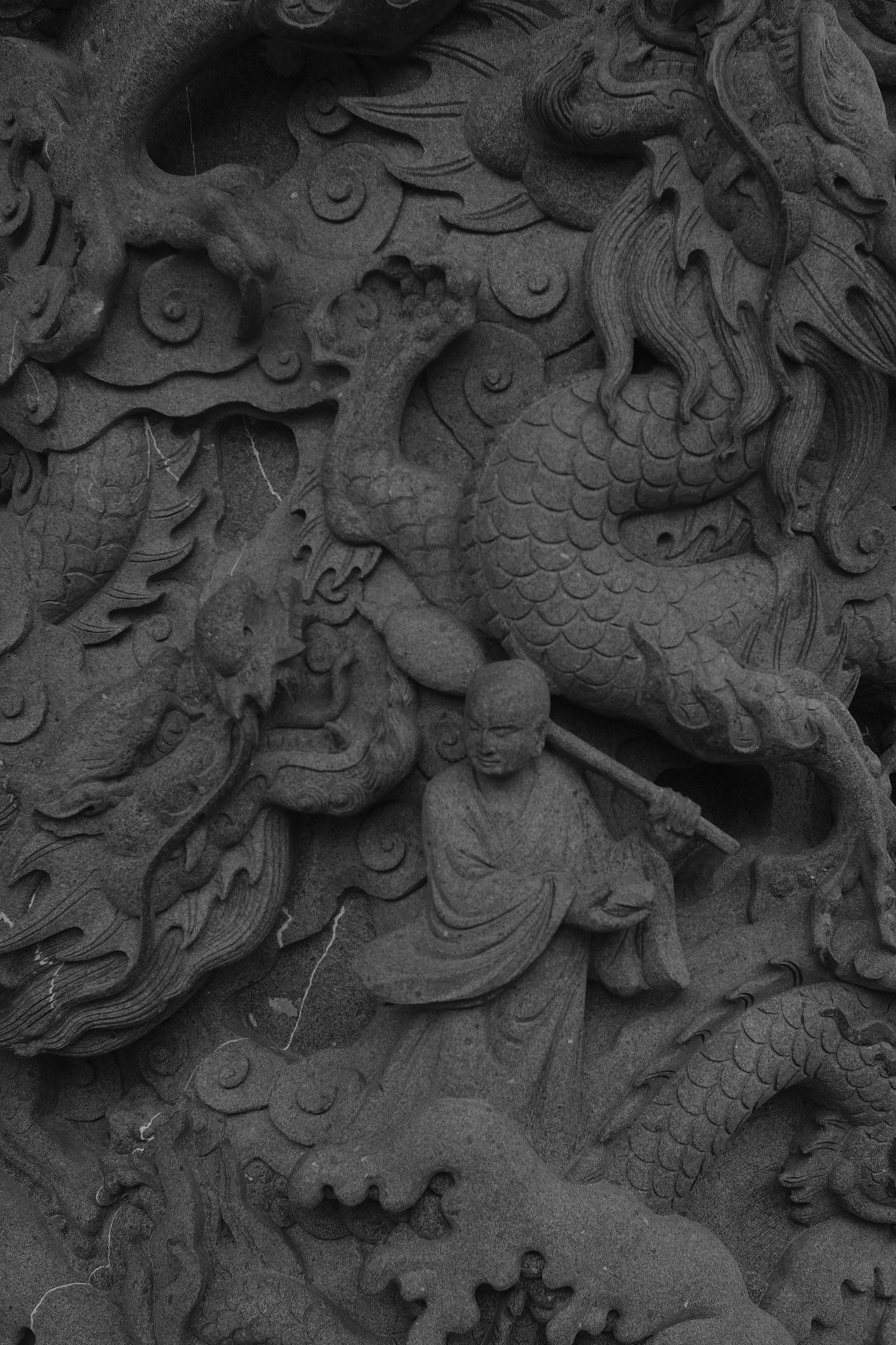Dragon-Guarded Monk in Bas-Relief