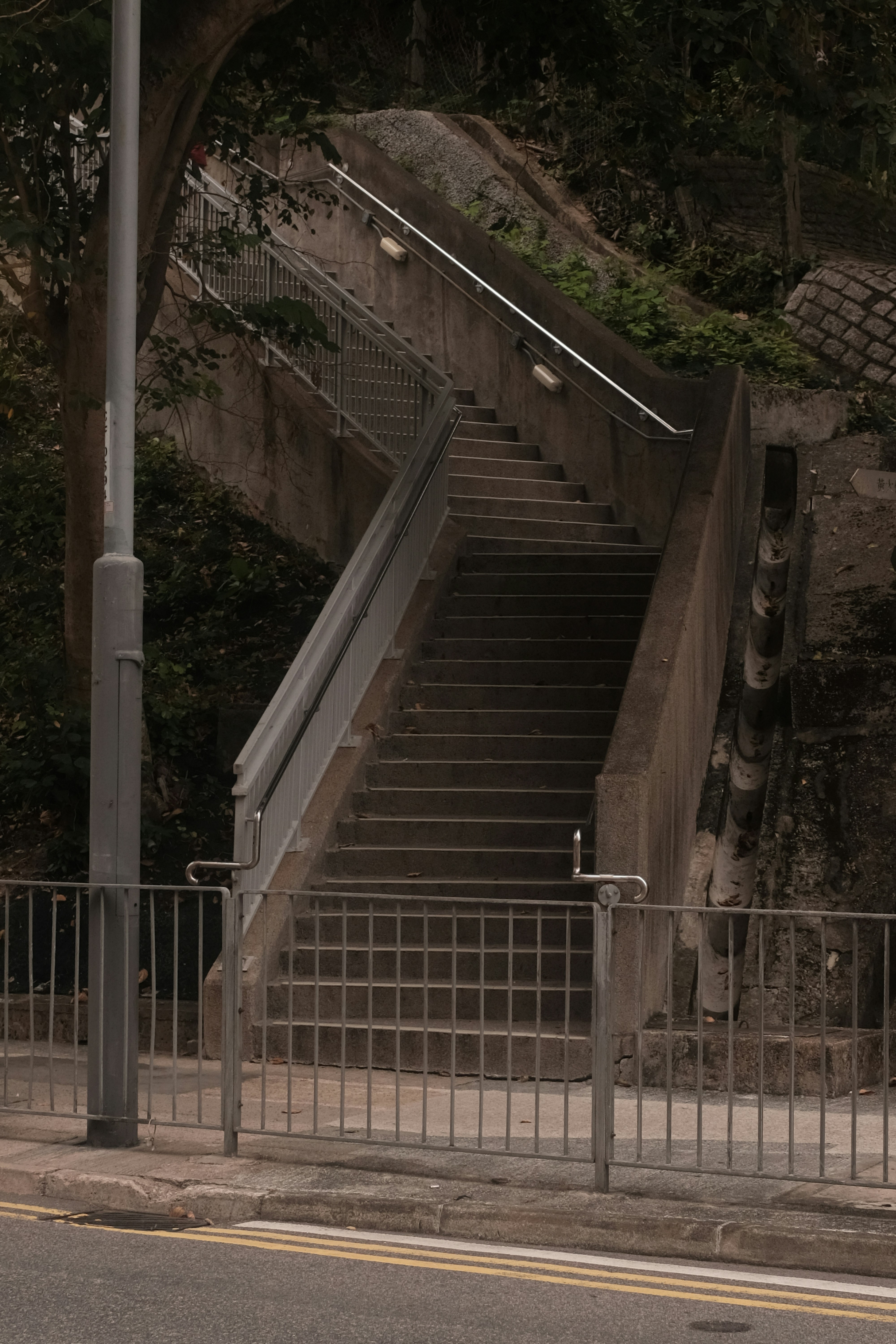 Urban Stairway Corridor: A Quiet Ascent Through Concrete and Railings