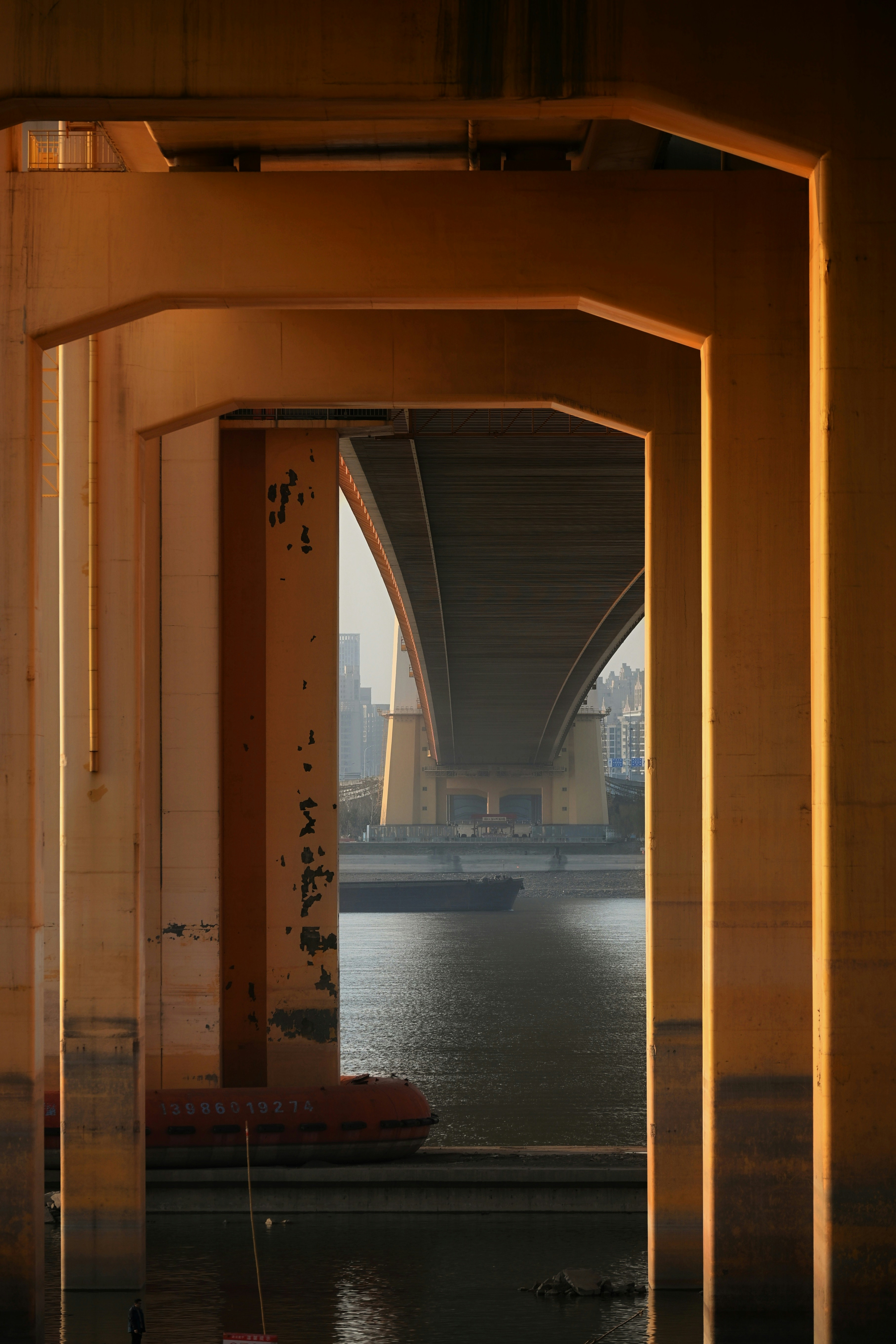 Golden Archway Through a River Bridge Corridor