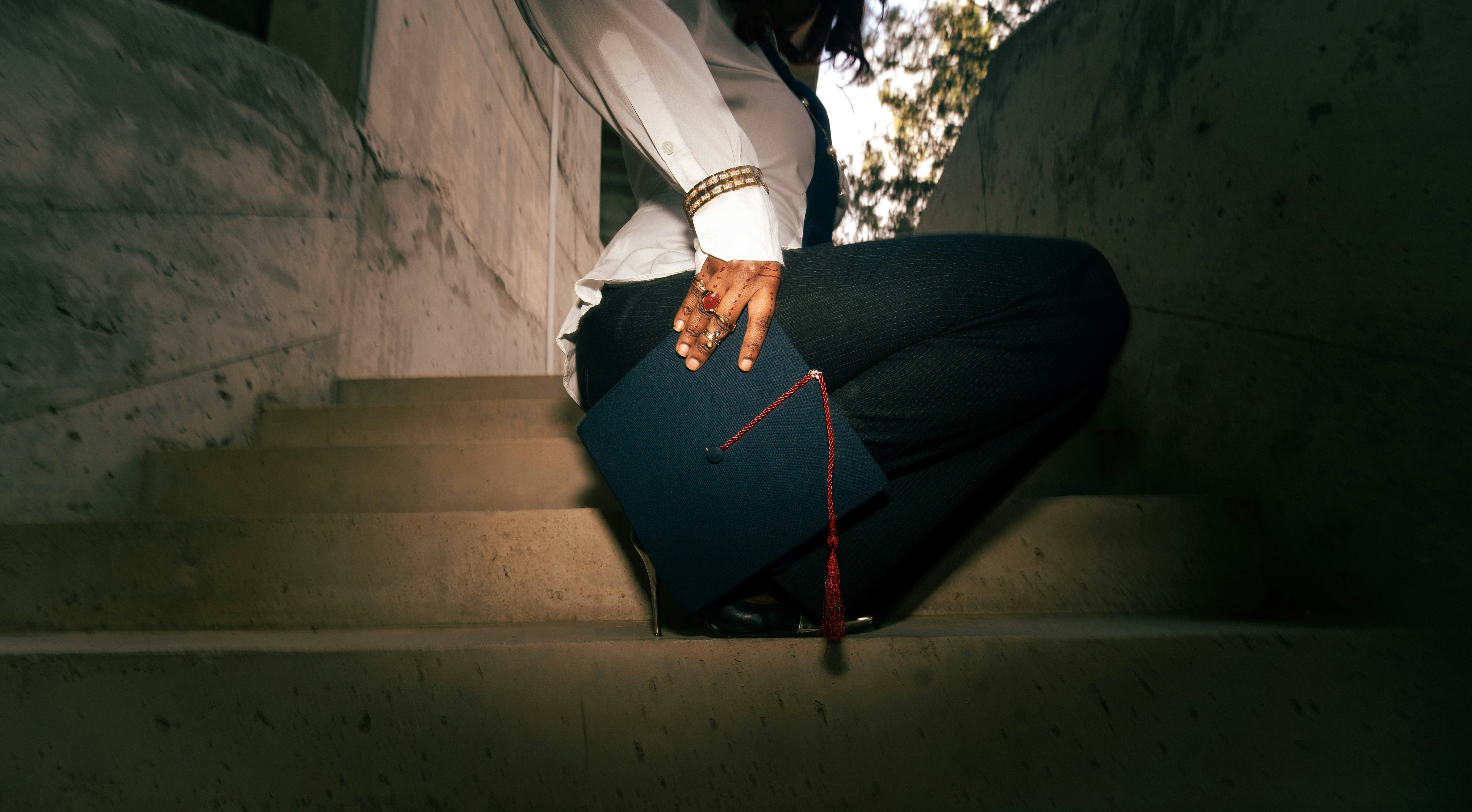 Graduation in the Shadows: A Descending Moment on Concrete Stairs