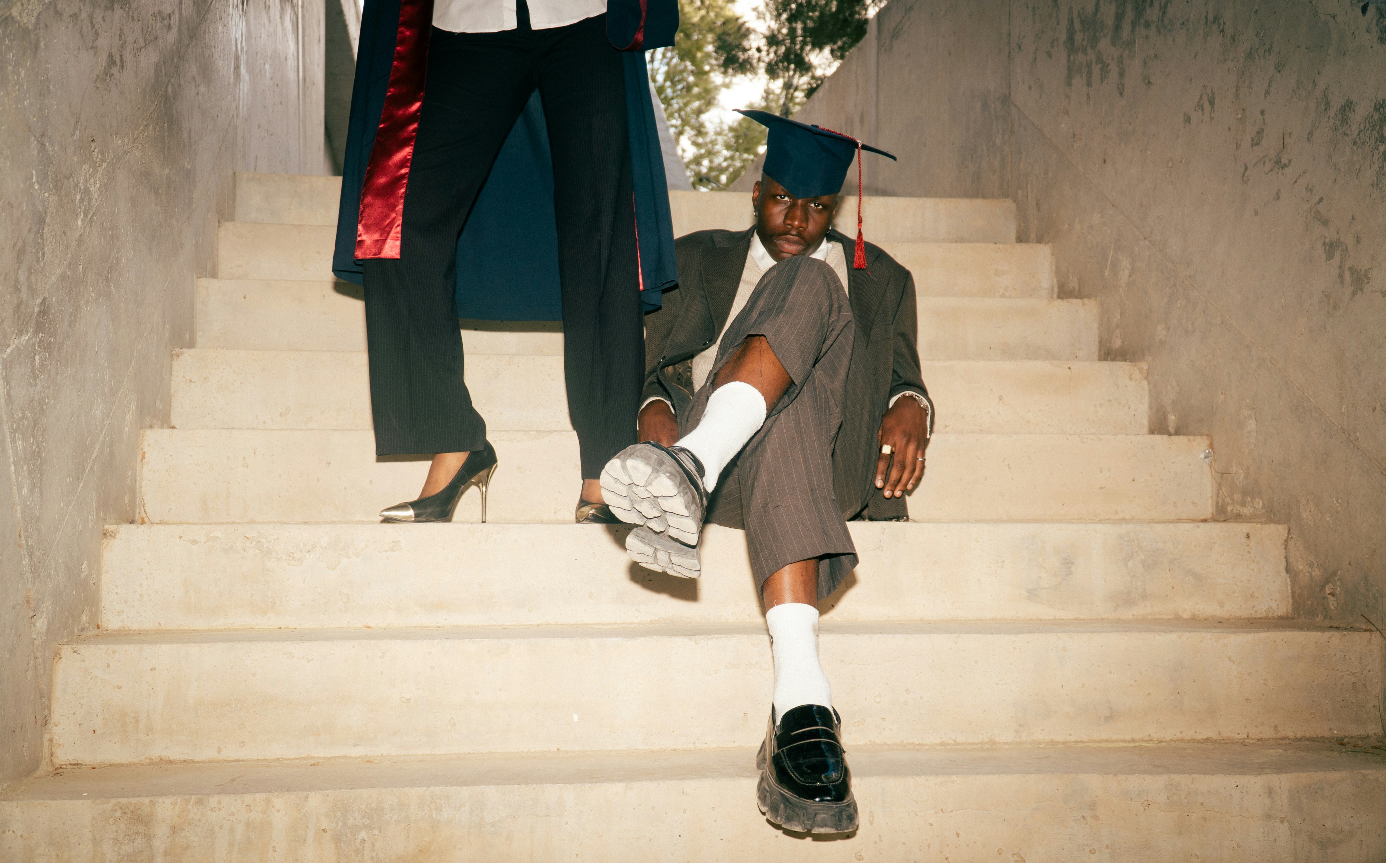Graduation Step: A Moment of Laughter on Schoolstairs