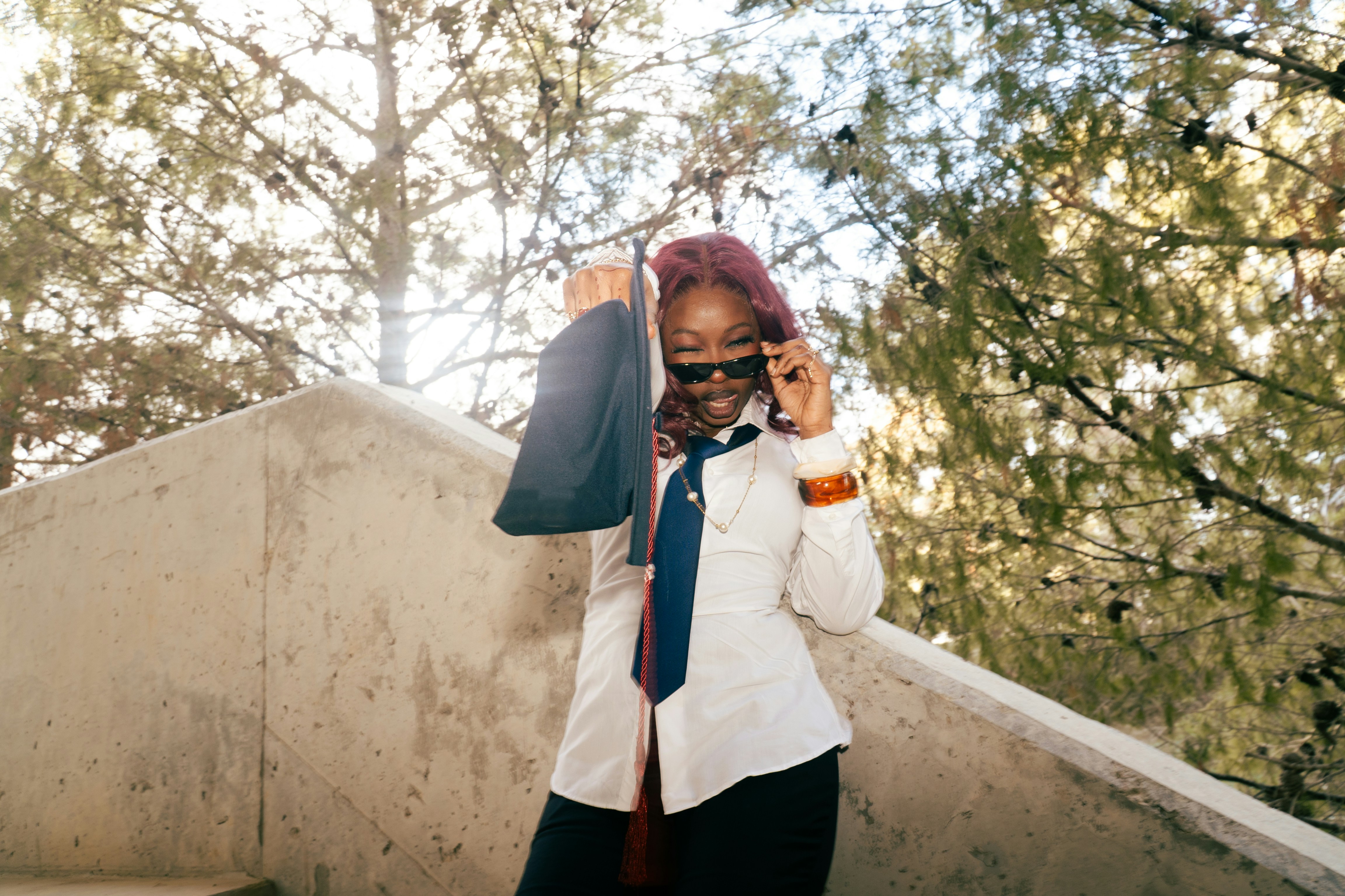 Bright Street Style: A Confident Portrait on Concrete Steps