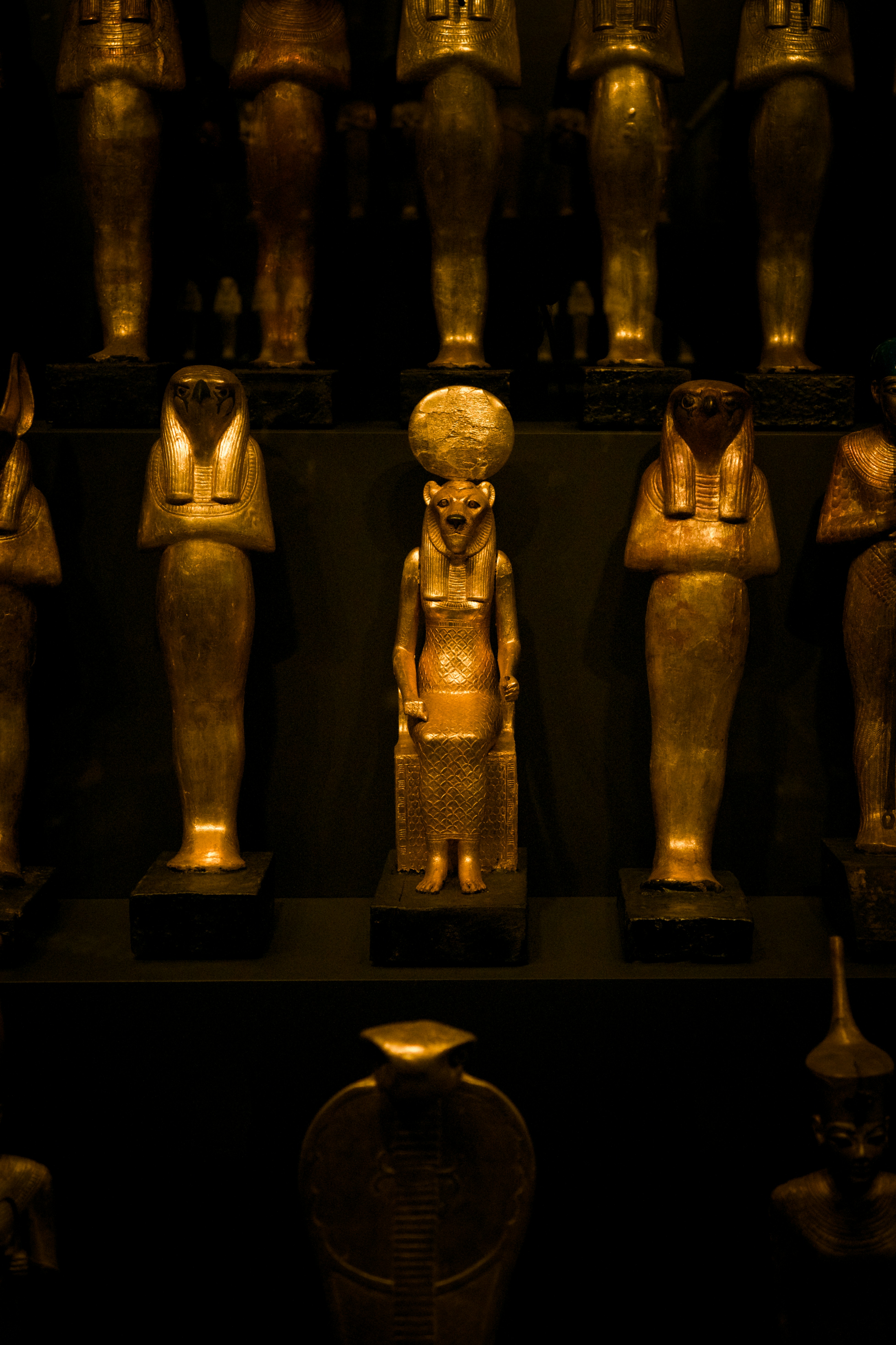 Golden Ankh Statues in Dim Display