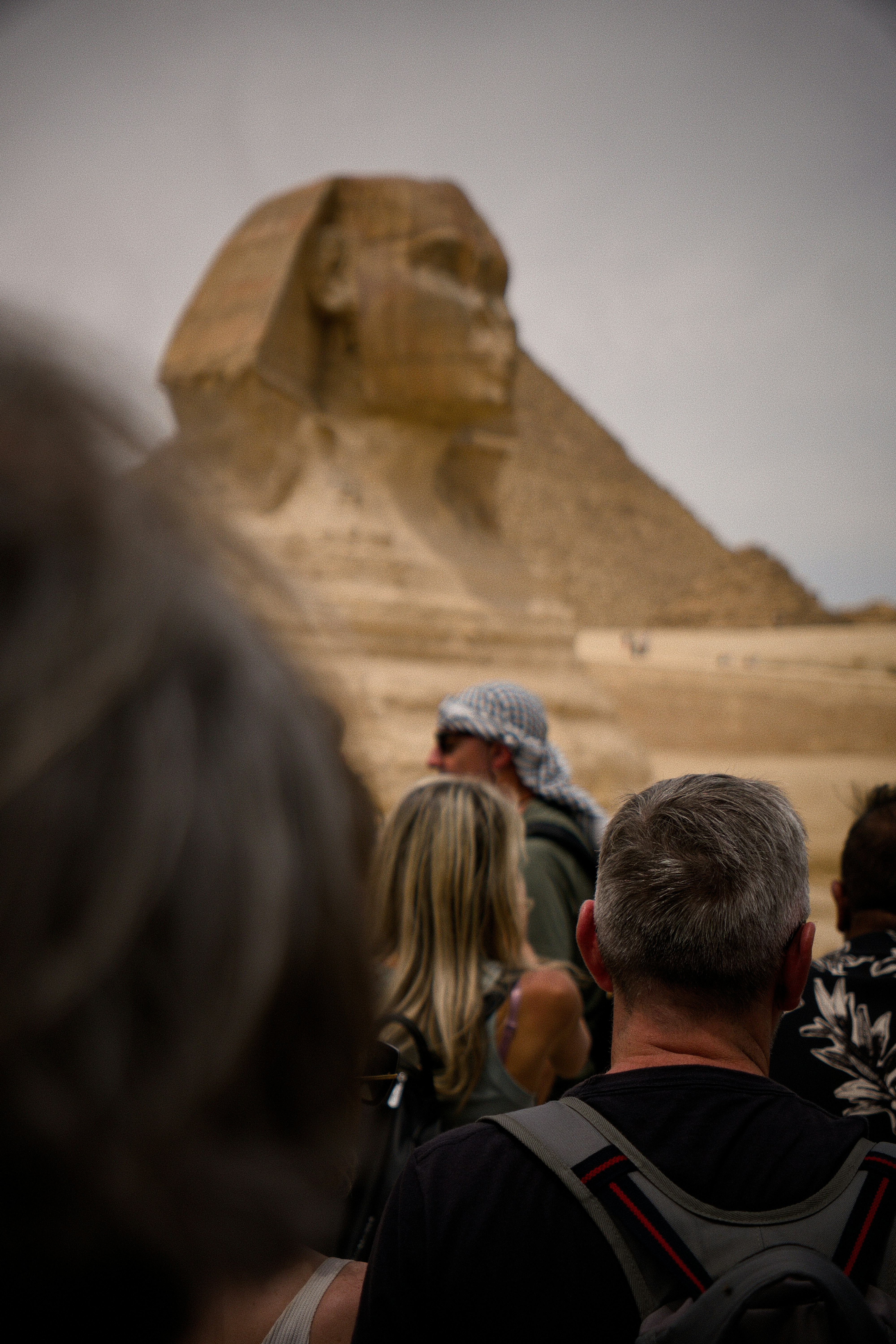 Beyond the Crowd: The Sphinx Faces the Quiet Observer