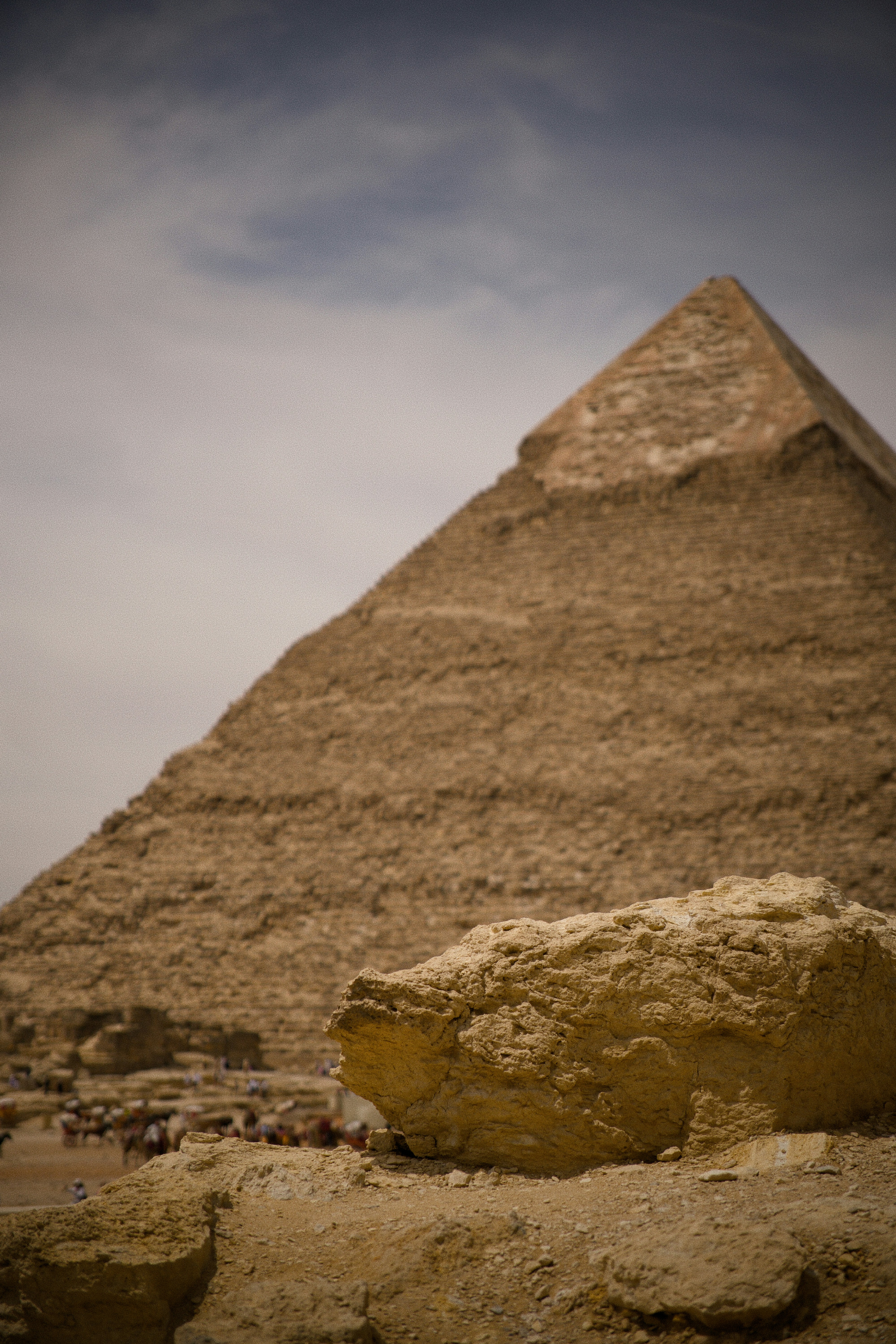 Pyramid Sentinel: Weathered Stones Against a Vast Desert Sky