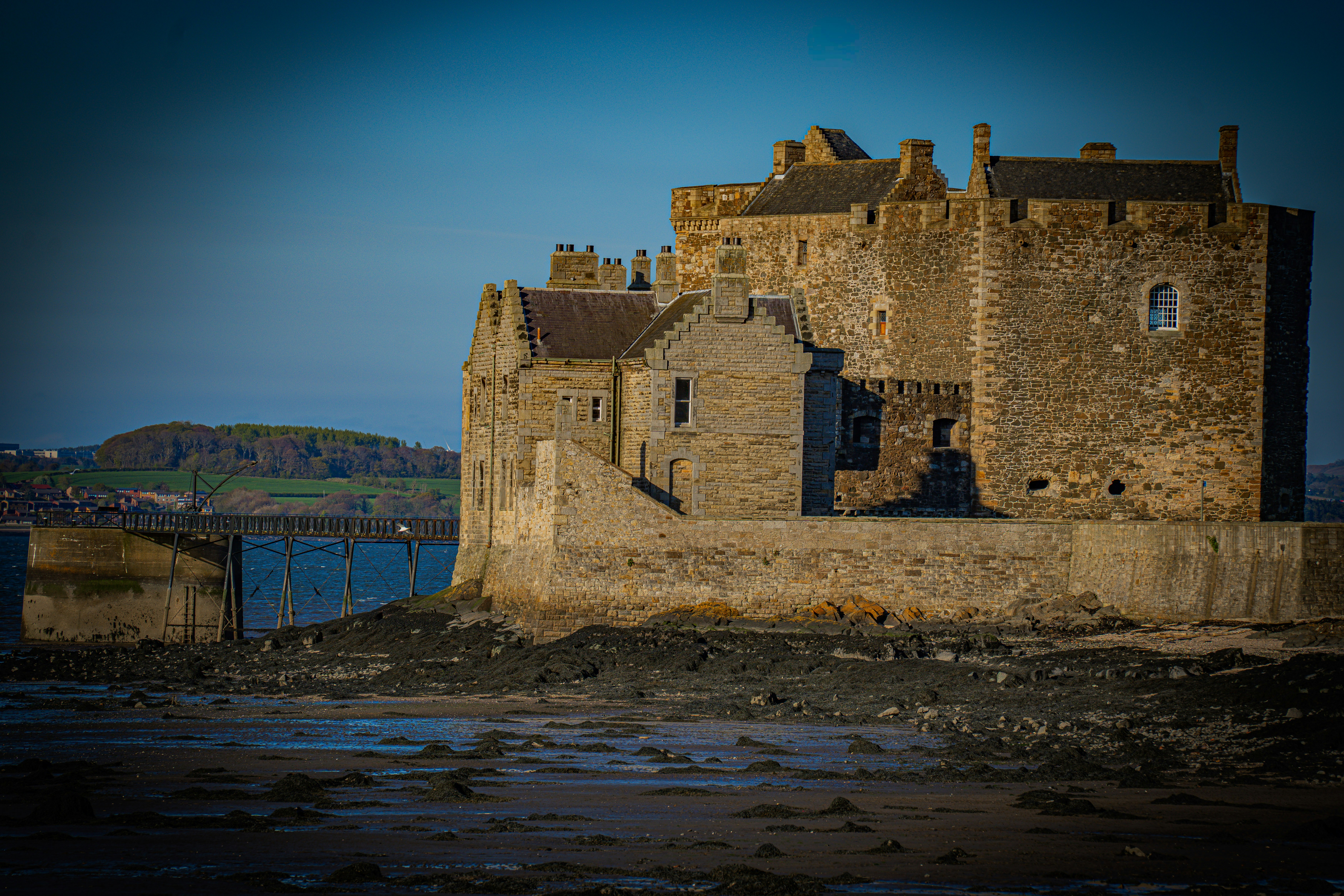 Fortress on the Tides: Sunlit Keep by the Sea