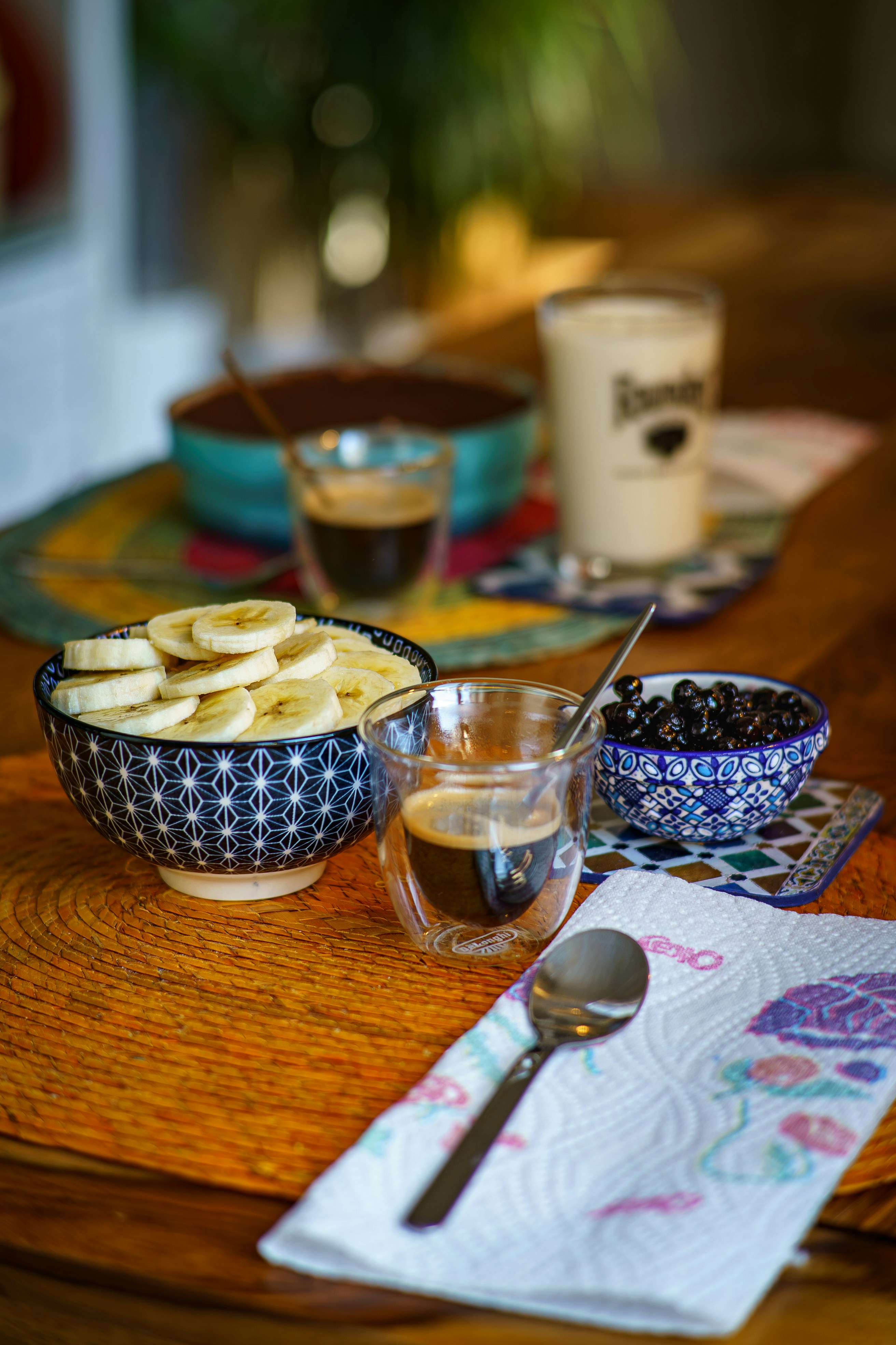 Banana Bowl and Espresso on a Colorful Table Scene