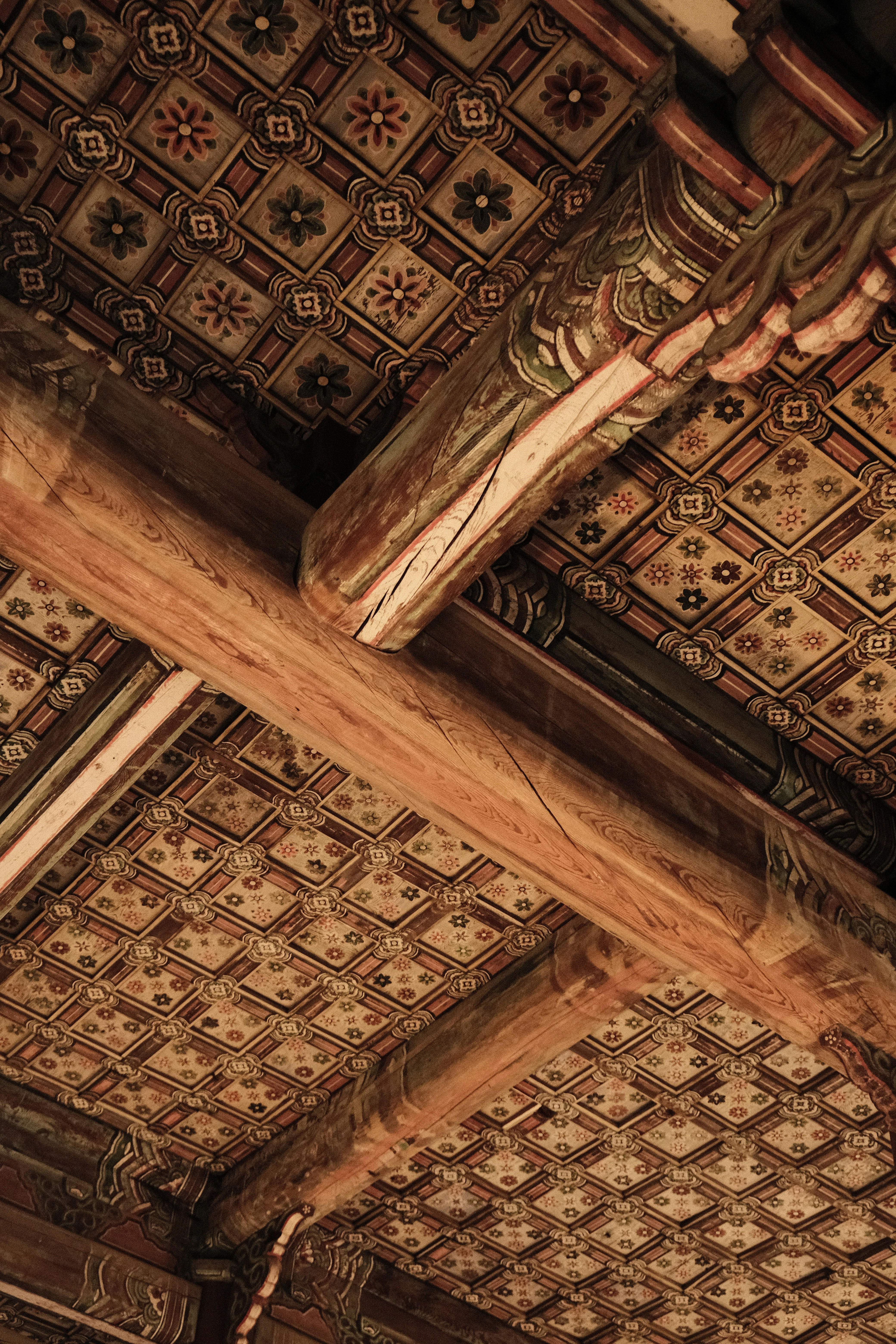 Carved Timber and Tile: An Interior of Woven Pattern and Rustic Beams