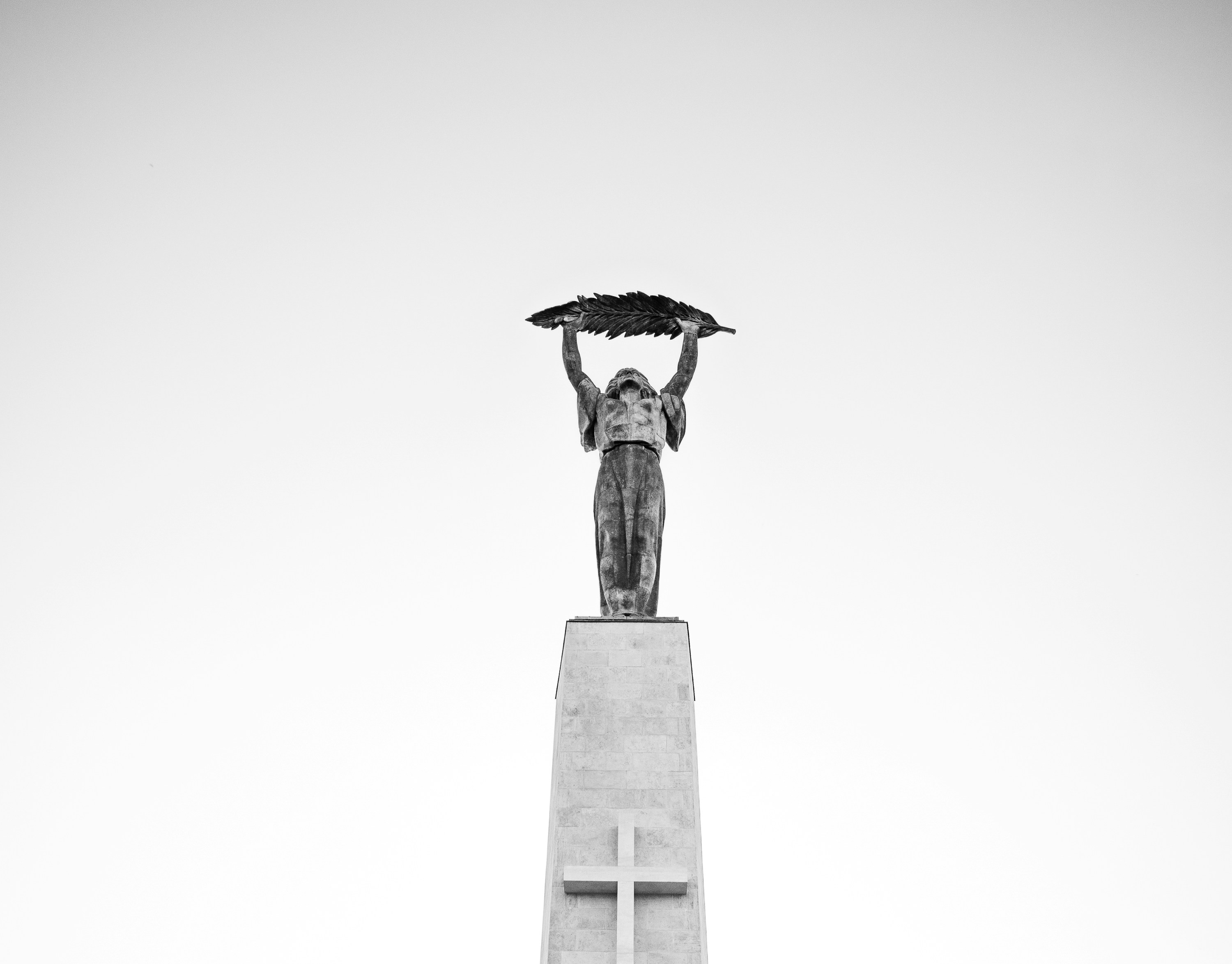 Winged Offering: A Beacon Above the Cross