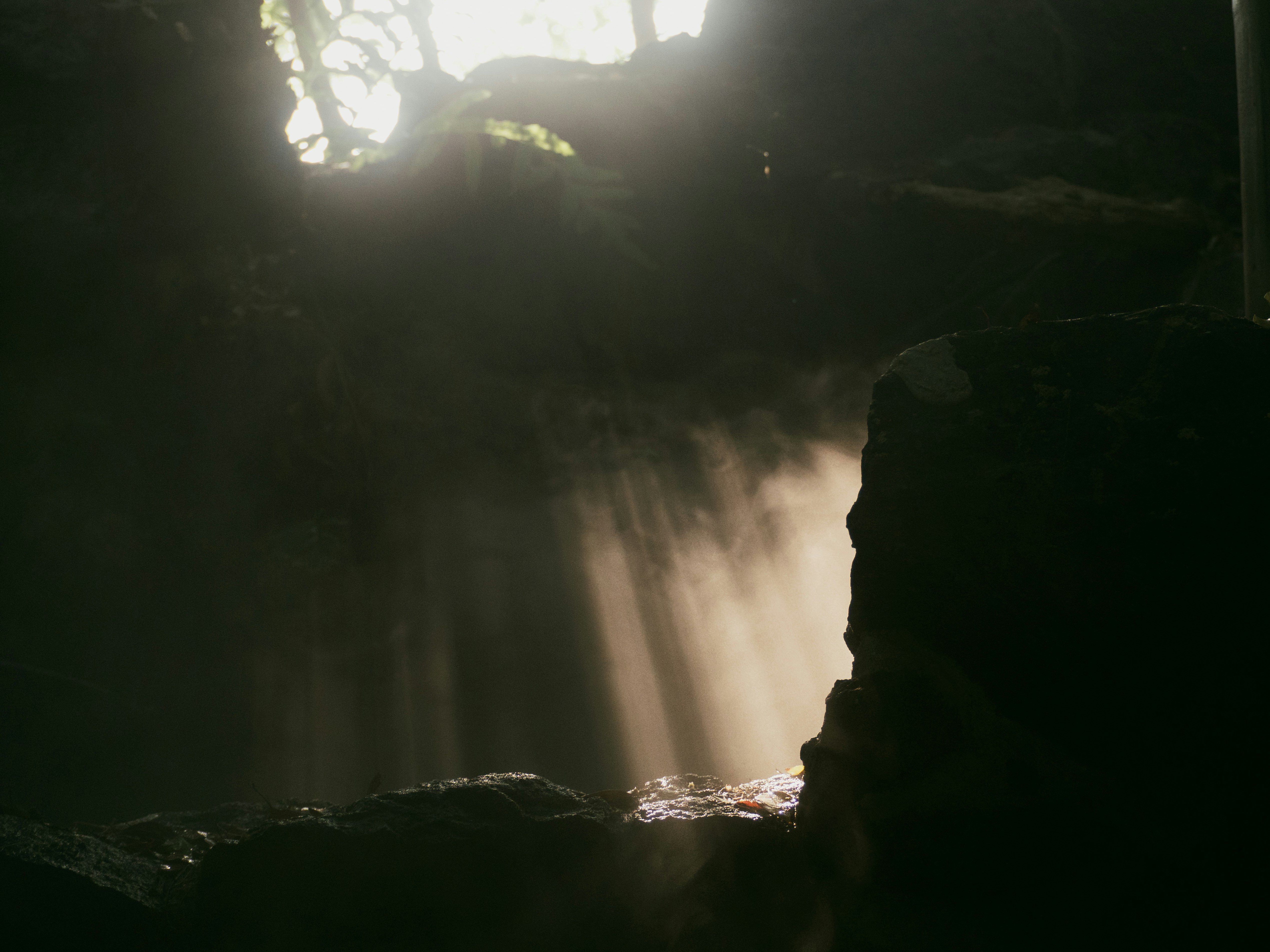 Sunbeams Through the Cave: Quiet Light on Wet Stone