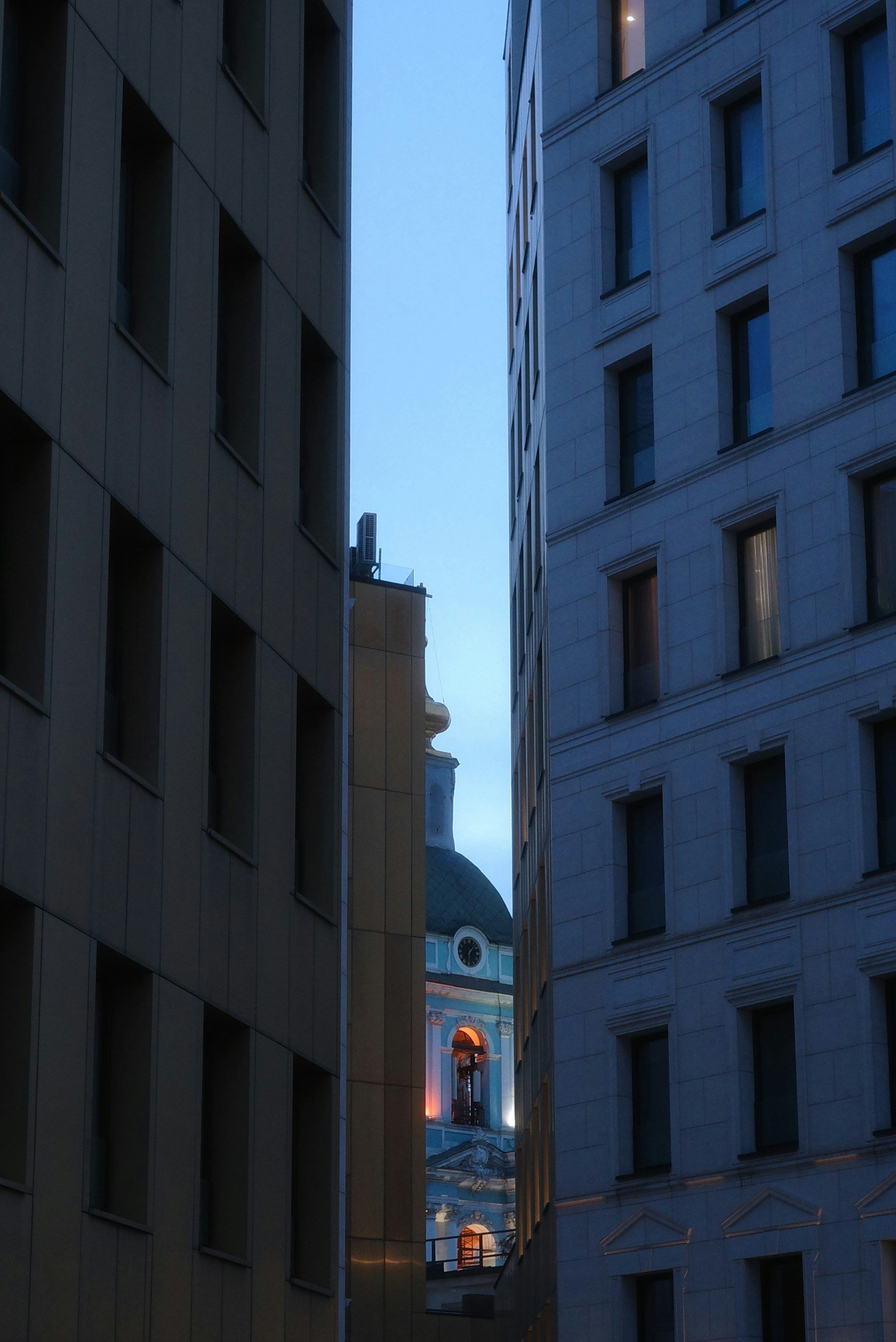 Between Towers: A Sliver of Sky and a Dome-Lined Horizon