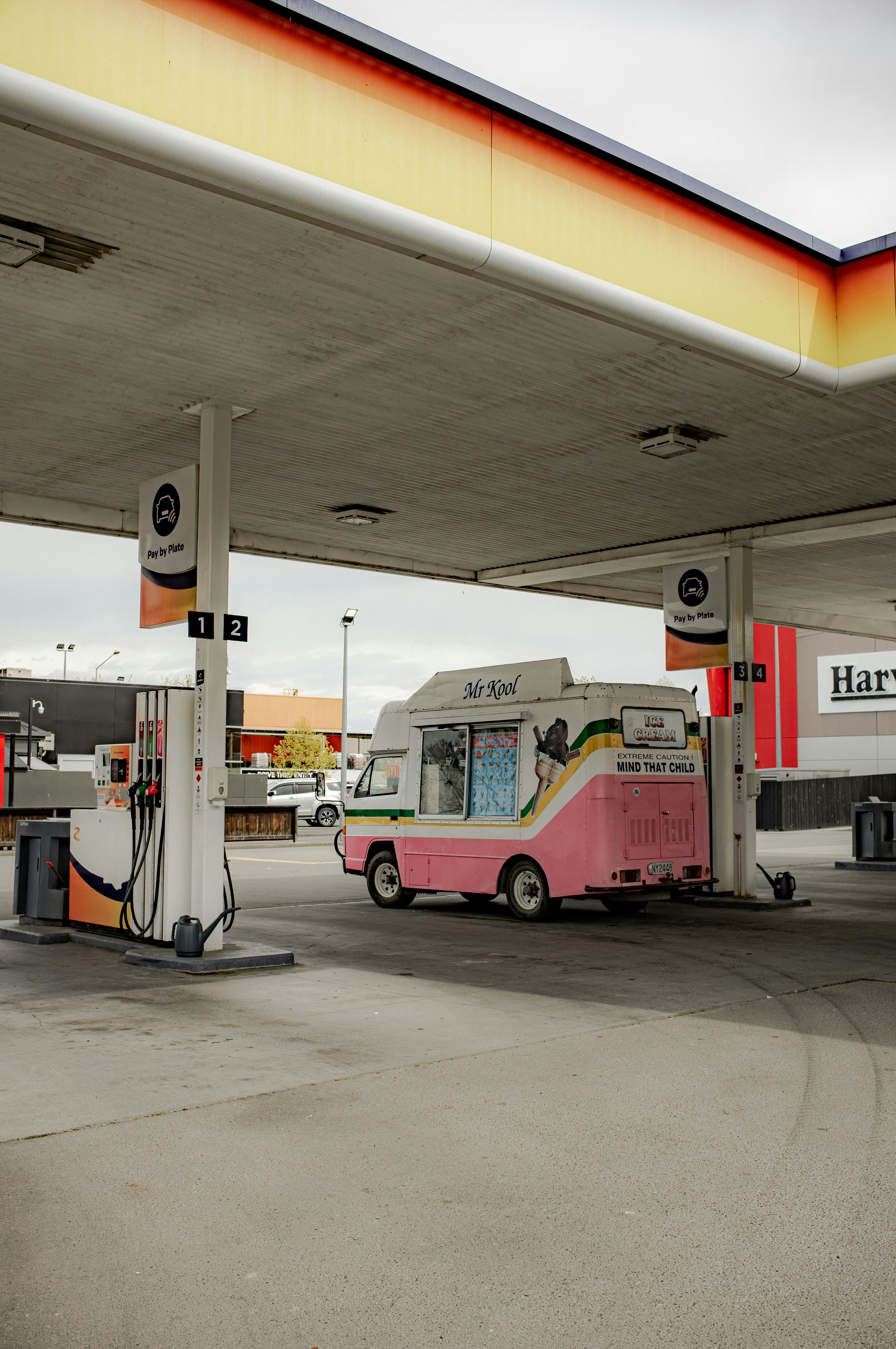 Pastel Ice Cream Truck at a Quiet Gas Station