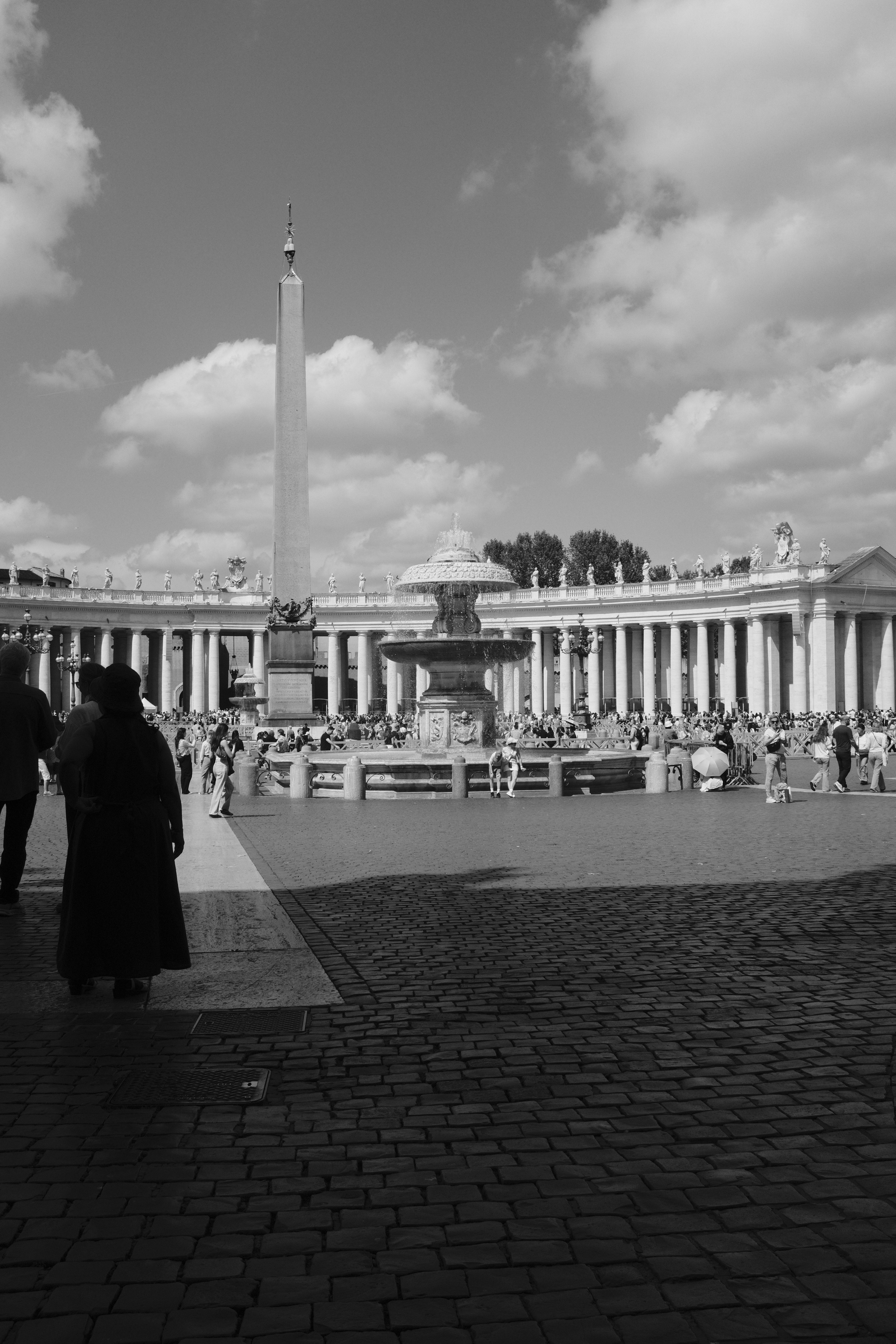 Obelisk Over Piazza: A Quiet Moment Beneath the Fountain