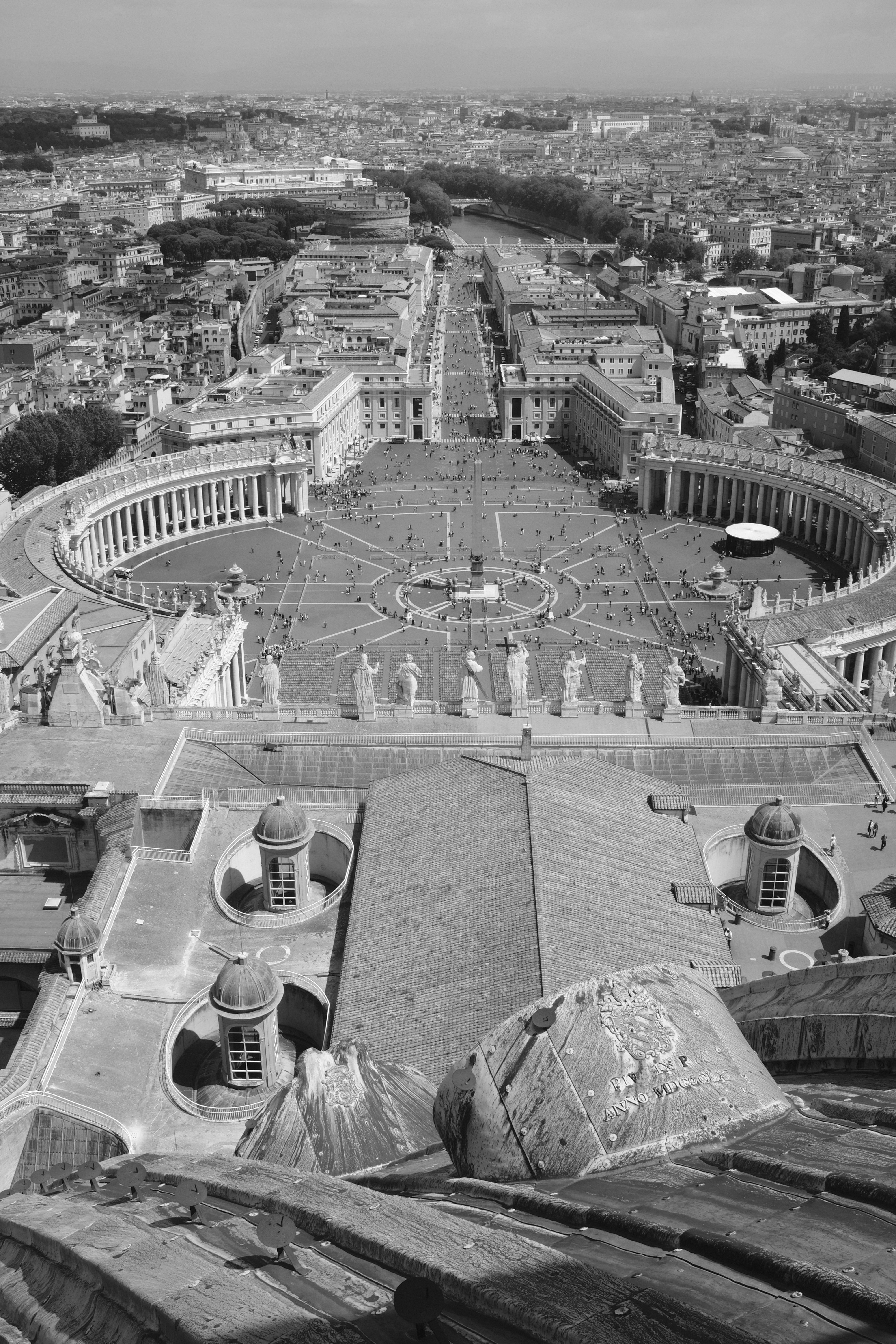 Rome from Above: A Circular Piazza Framed by Statues and Terrace Rooftops