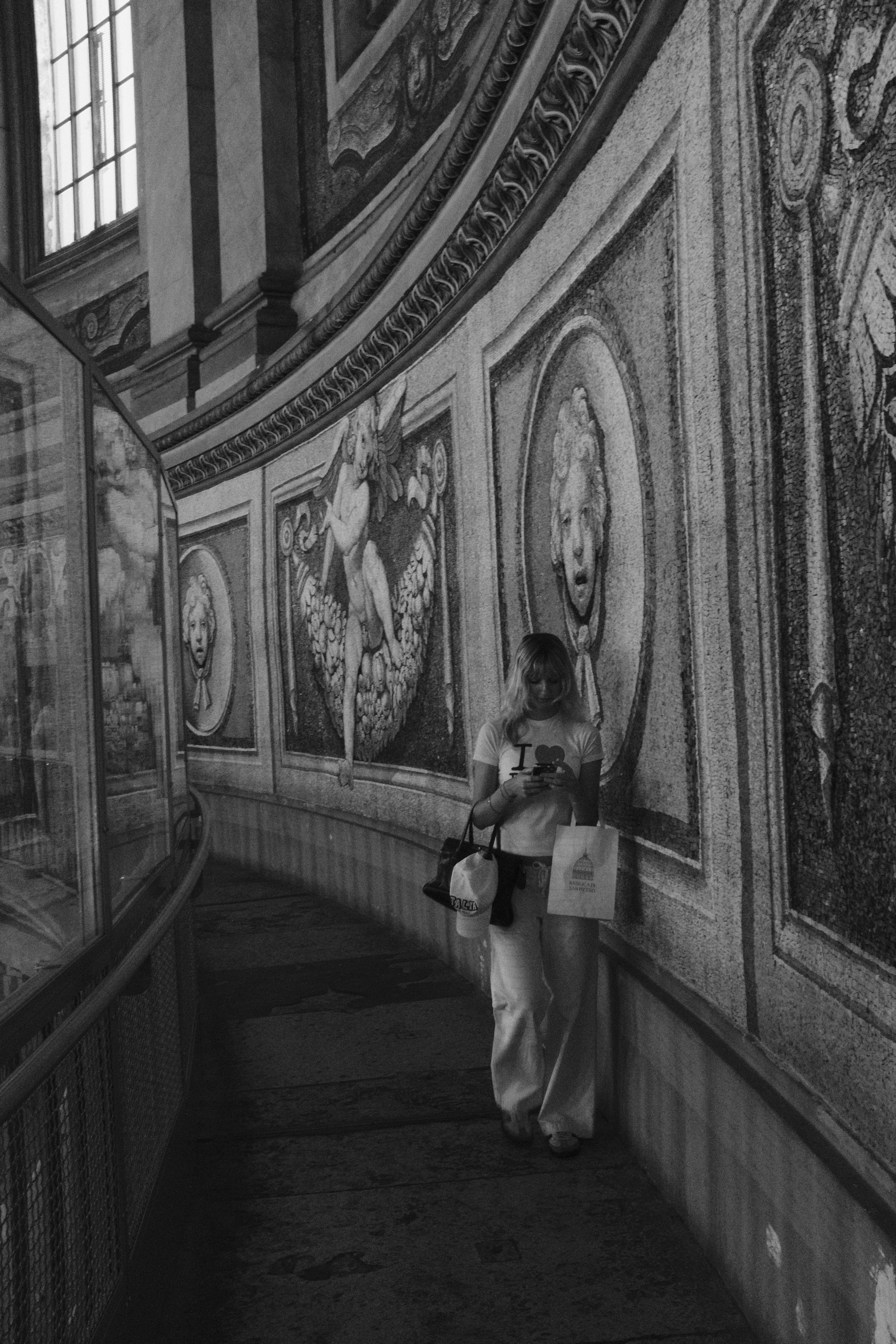 Hushed Portraits in an Ornate Tunnel