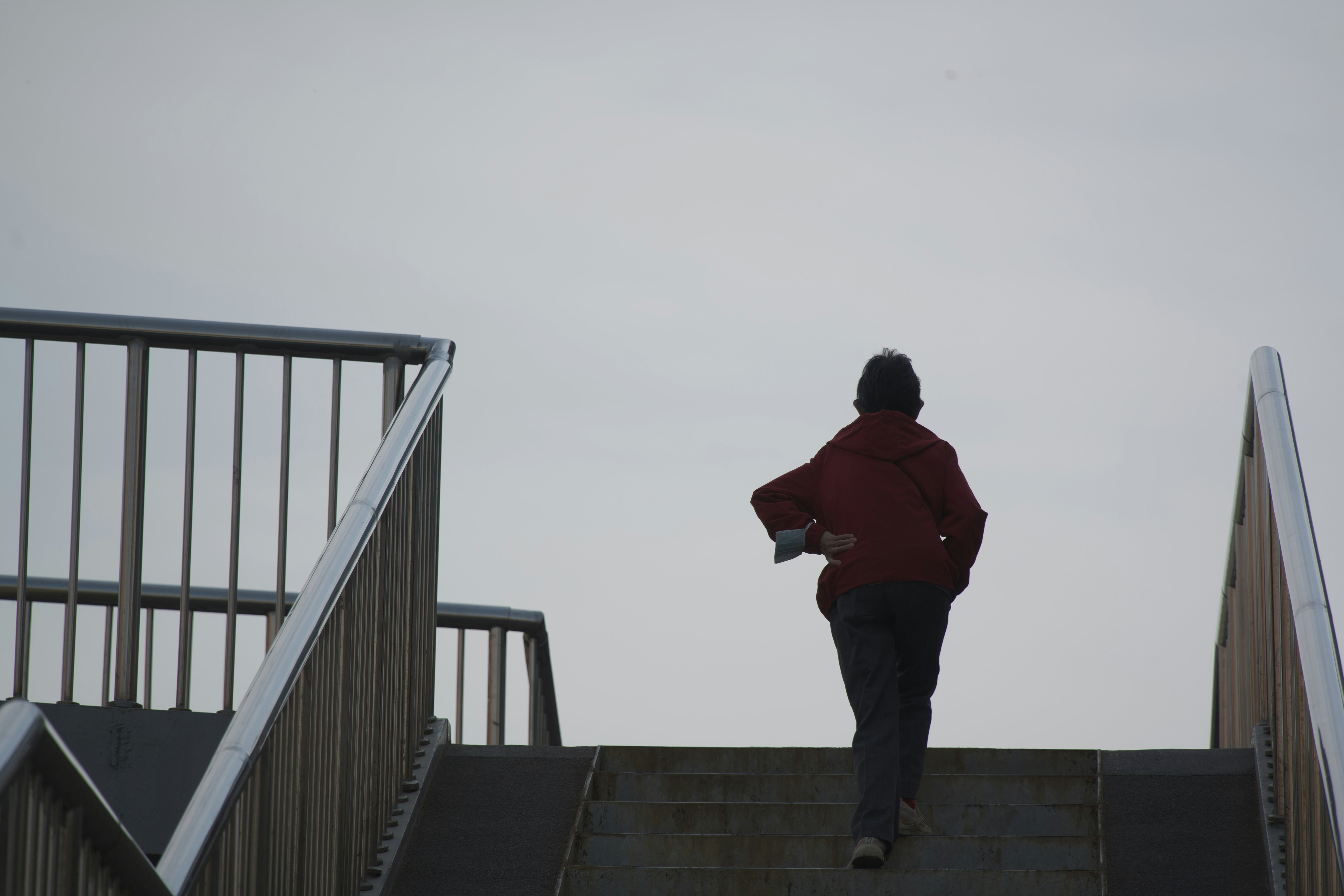 Stride to the Summit: A Rooftop Ascent at Dusk