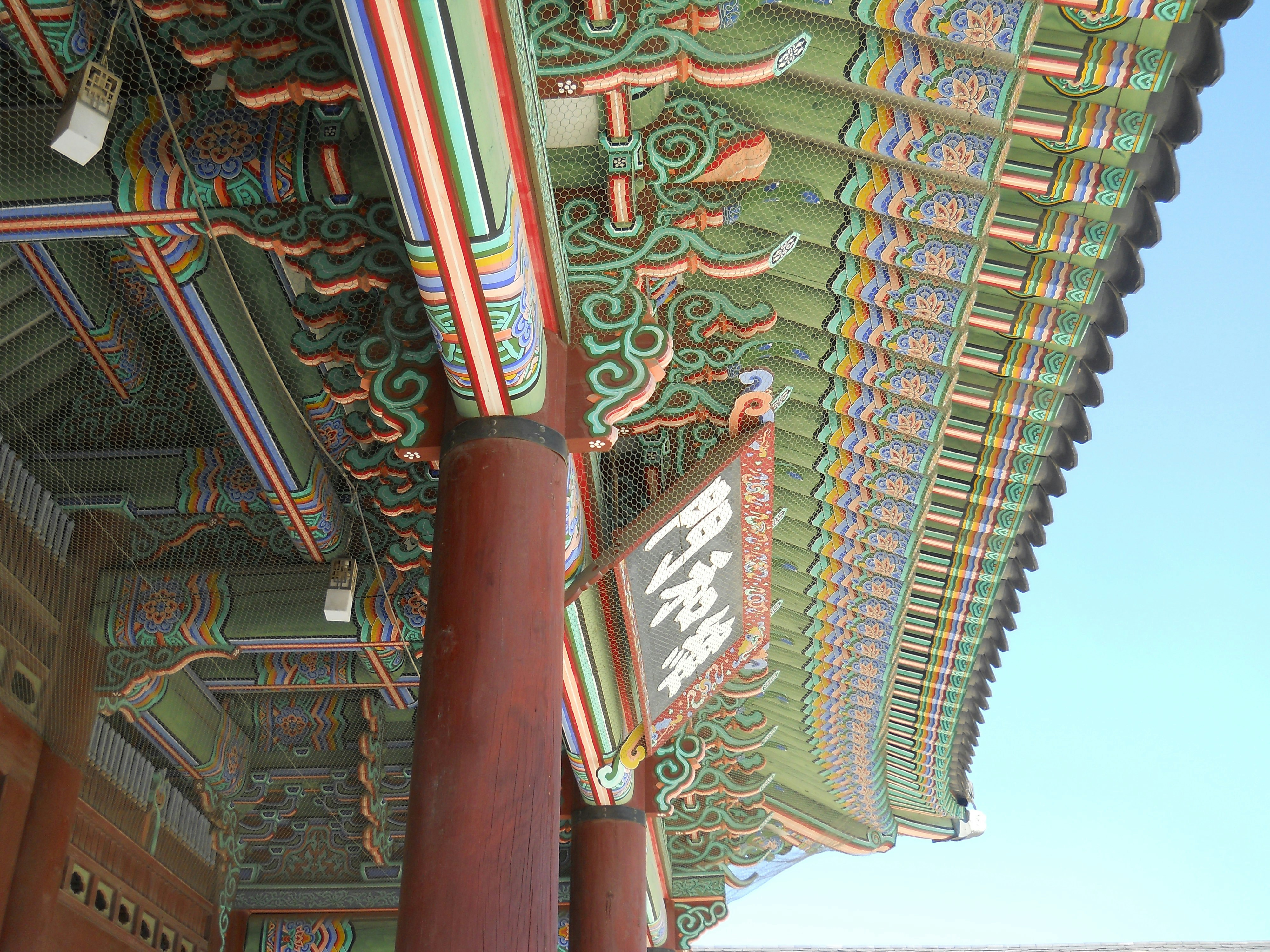 Ornate Rooflines and Ironwood: A Close-Up of East Asian Pavilion Details